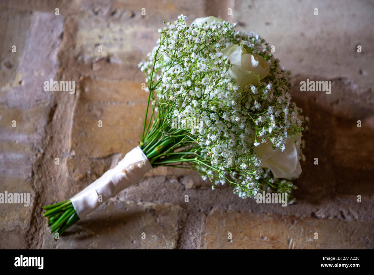 A bouquet made with Roses and Gypsophila Stock Photo - Alamy