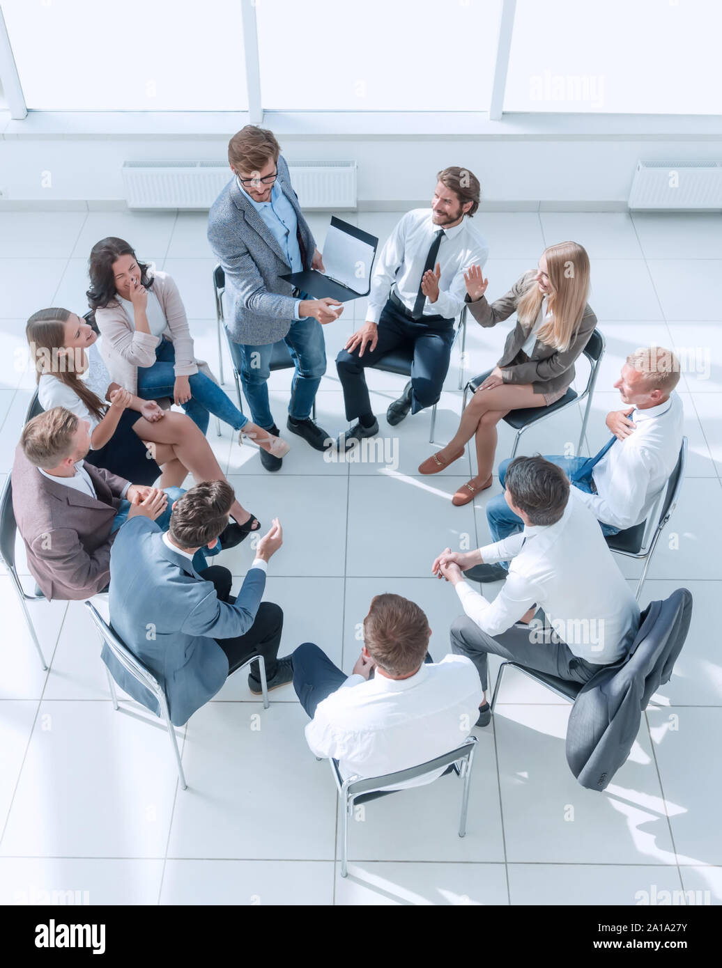 young employees ask questions during business training Stock Photo - Alamy
