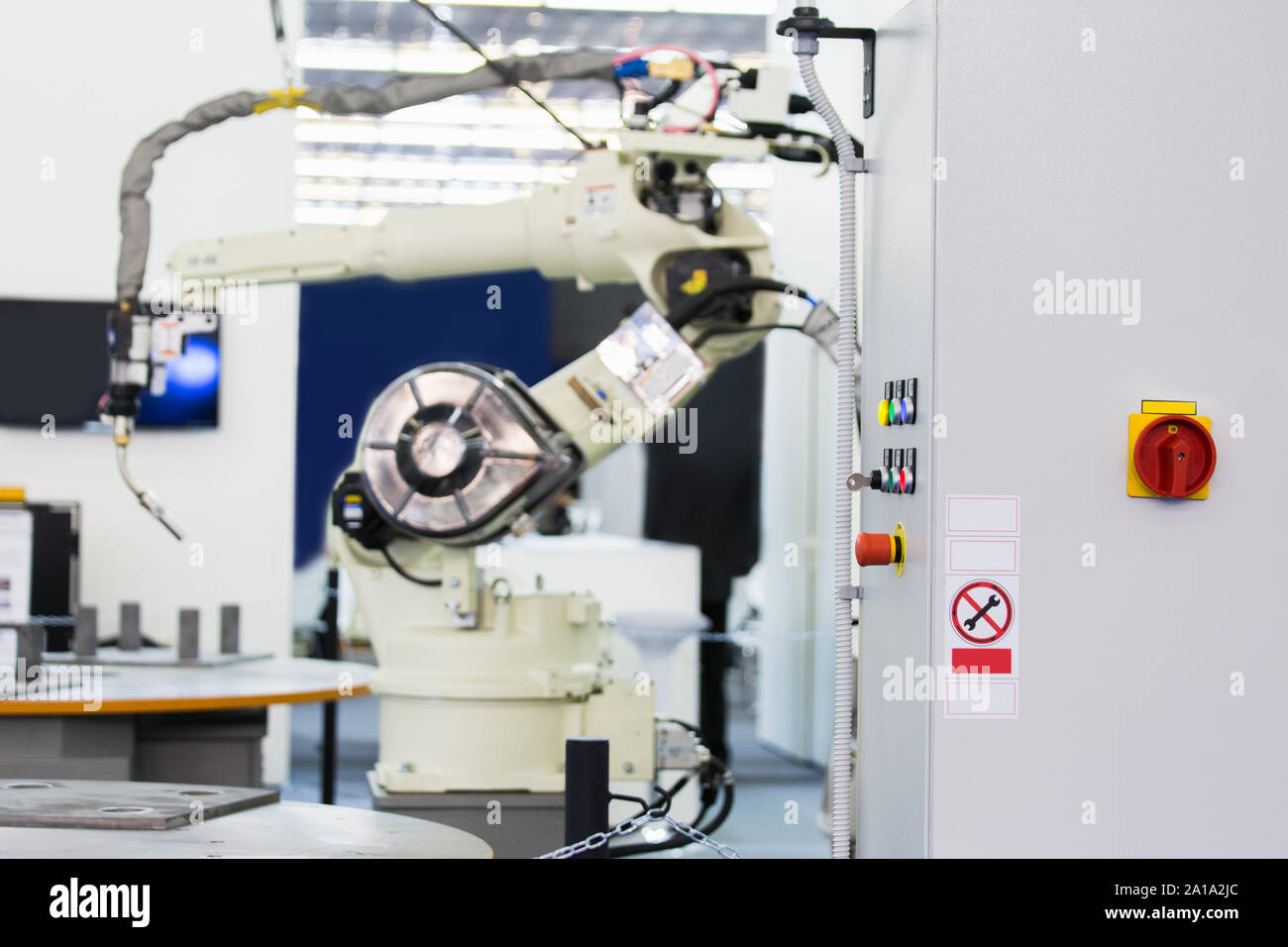 Automatic welding robot in a modern factory in operation Stock Photo ...