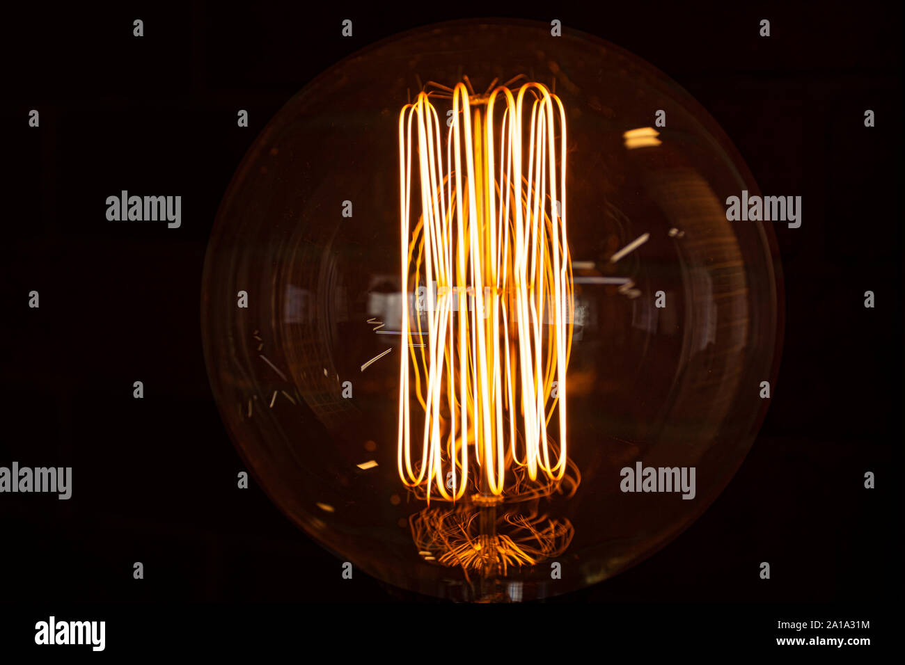 Beautiful decorative filament light bulb - Edison Style Stock Photo - Alamy