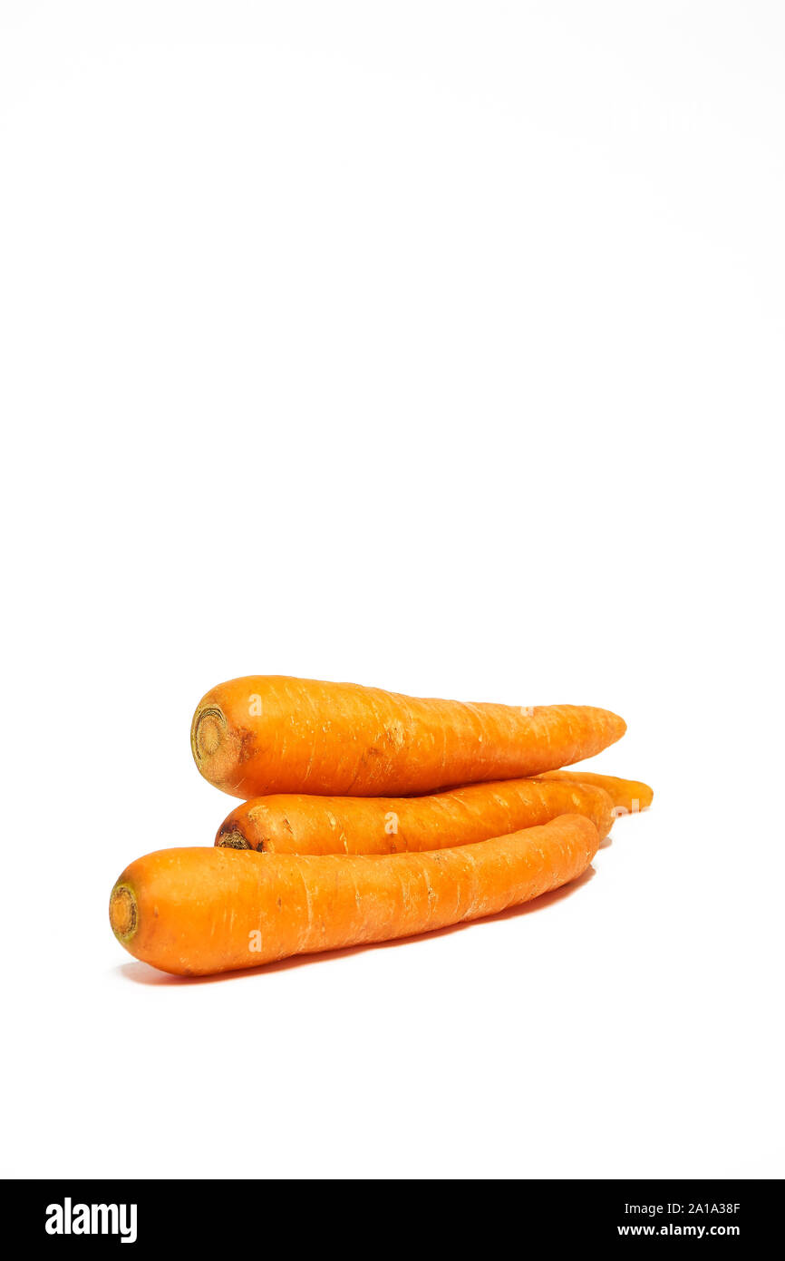carrots isolated white background , portrait orientation natural color ...