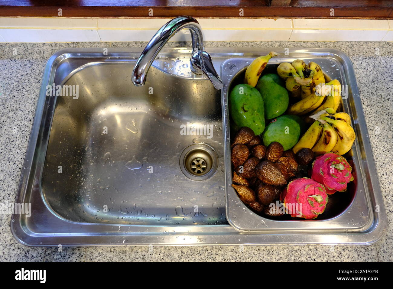 Indonesia Batam tropical fruits in kitchen sink Stock Photo - Alamy