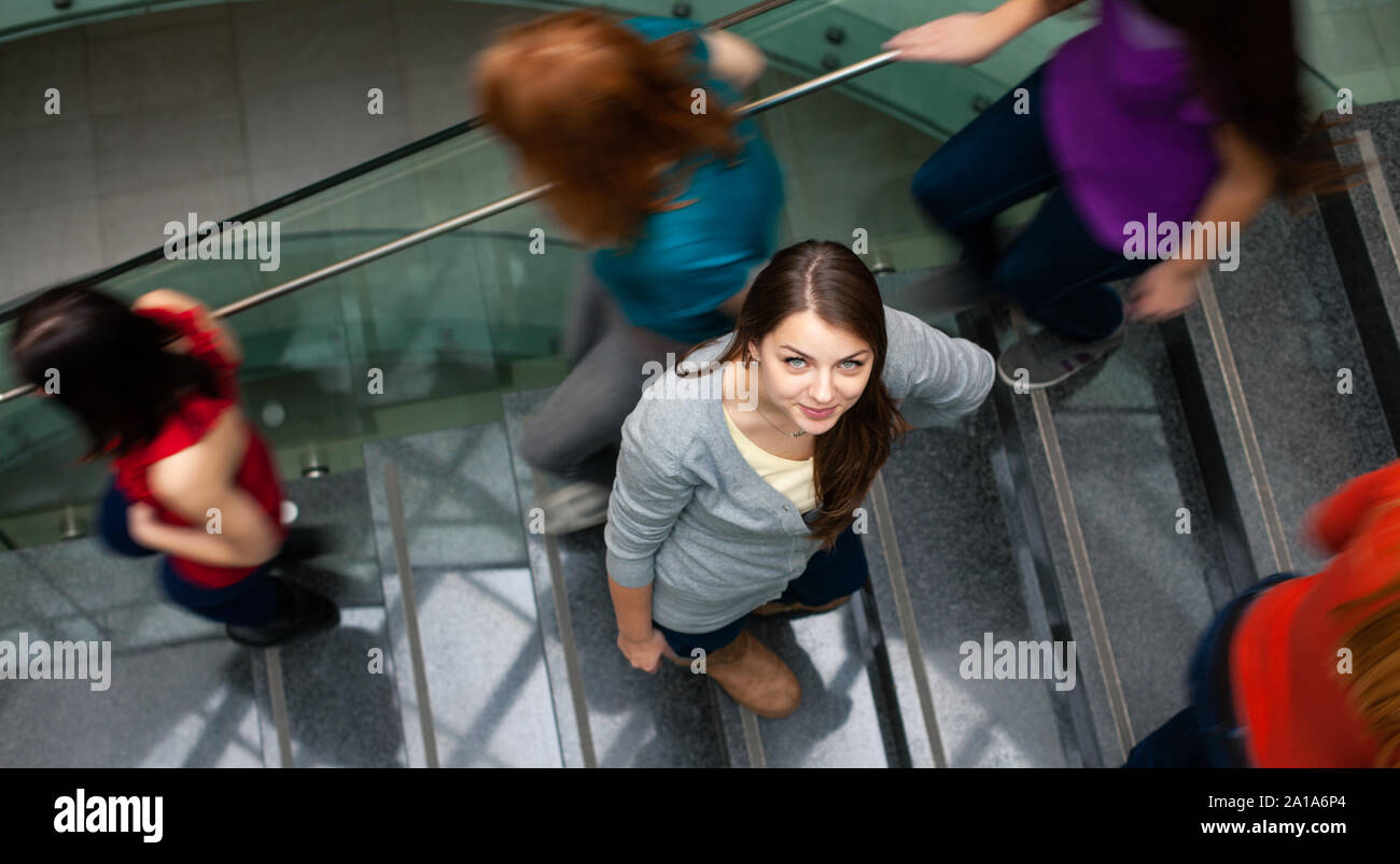 At the university/college - Students rushing up and down a busy ...