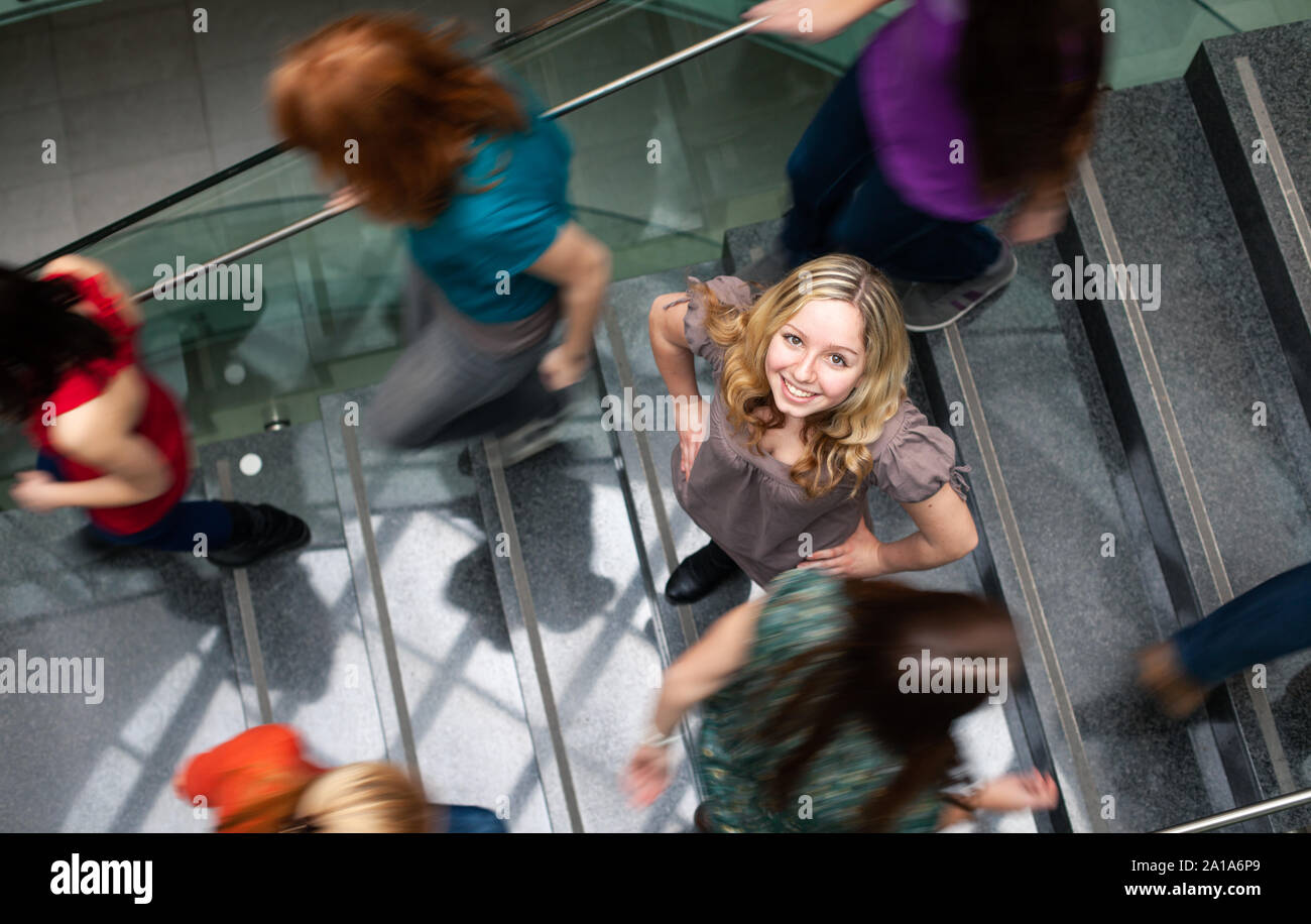At the university/college - Students rushing up and down a busy ...