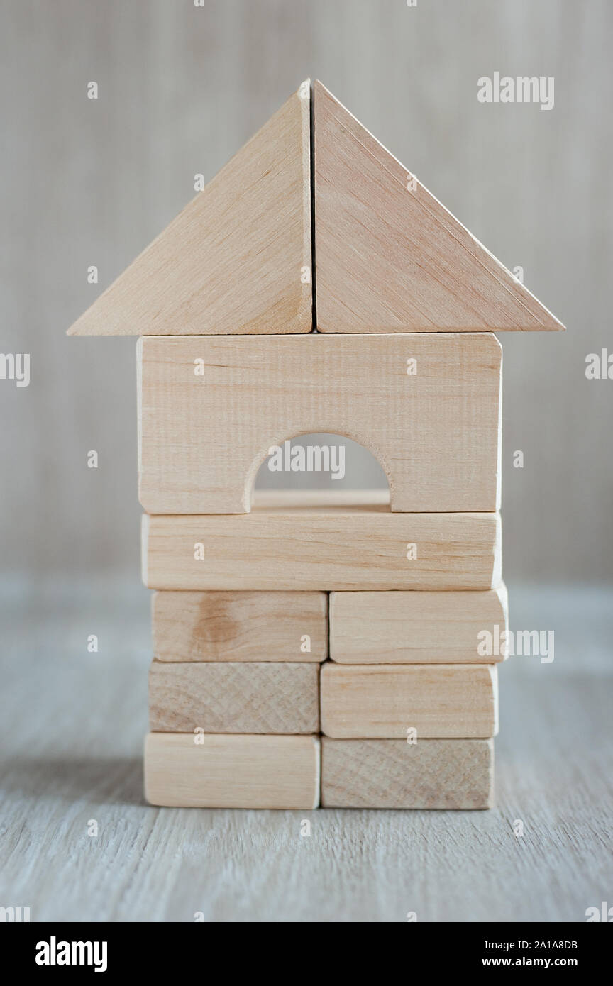 Wooden block house on white background. wooden building blocks ...
