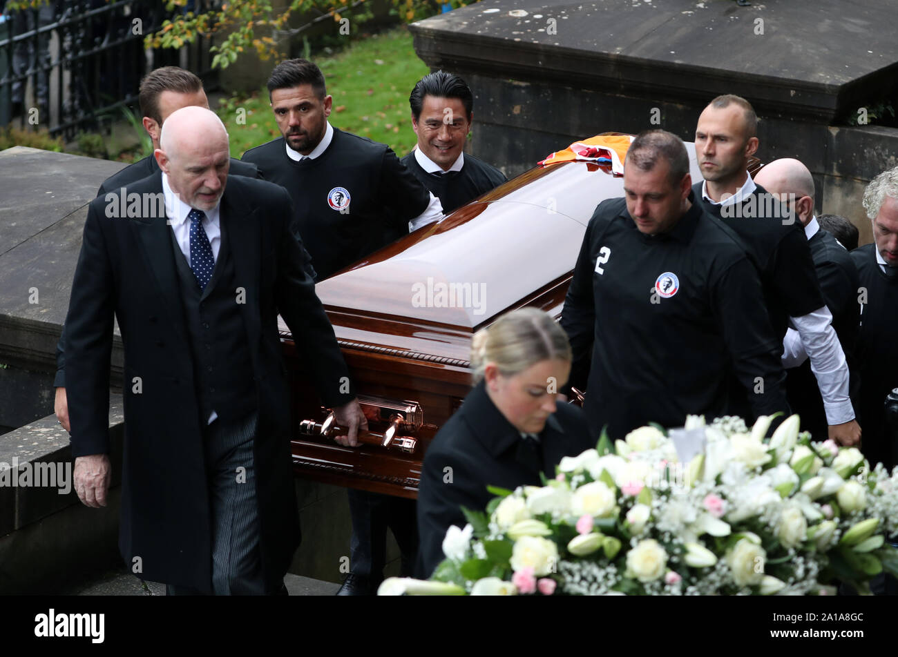 Pallbearer's including former Rangers players Michael Mols, Nacho Novo ...