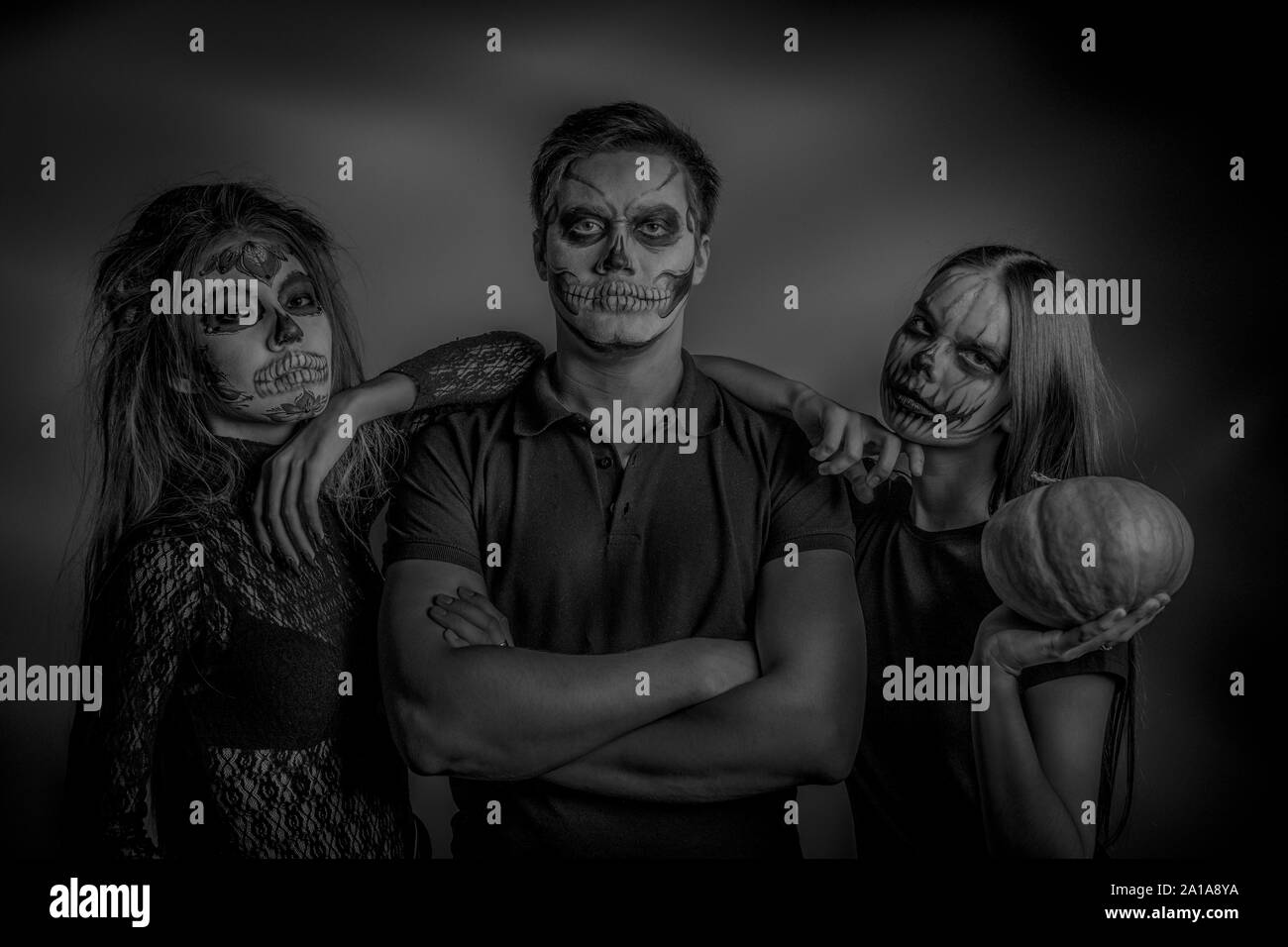 Black and white portrait of young people painted like zombies ...