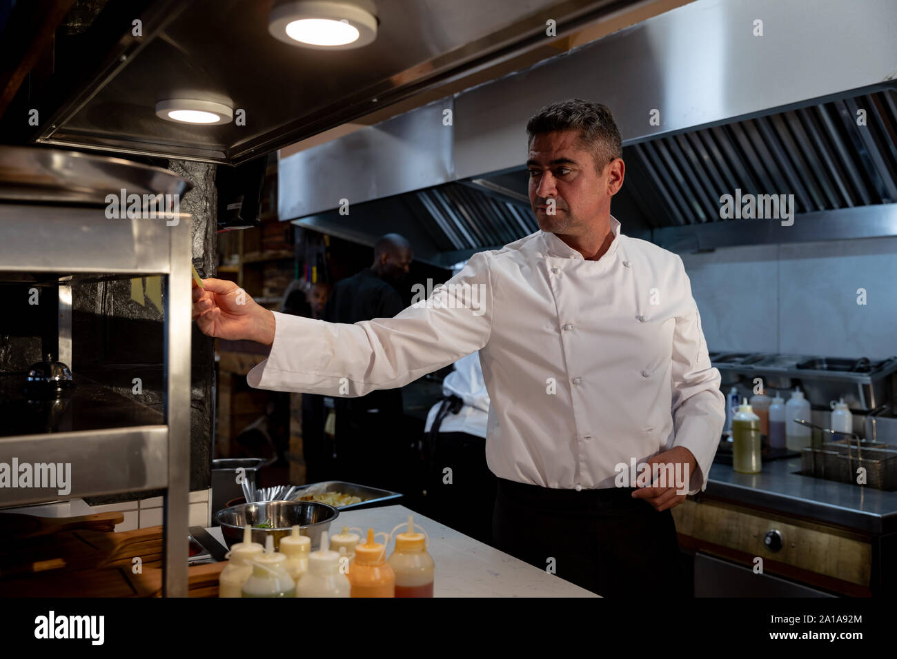 Checking the menu hi-res stock photography and images - Alamy