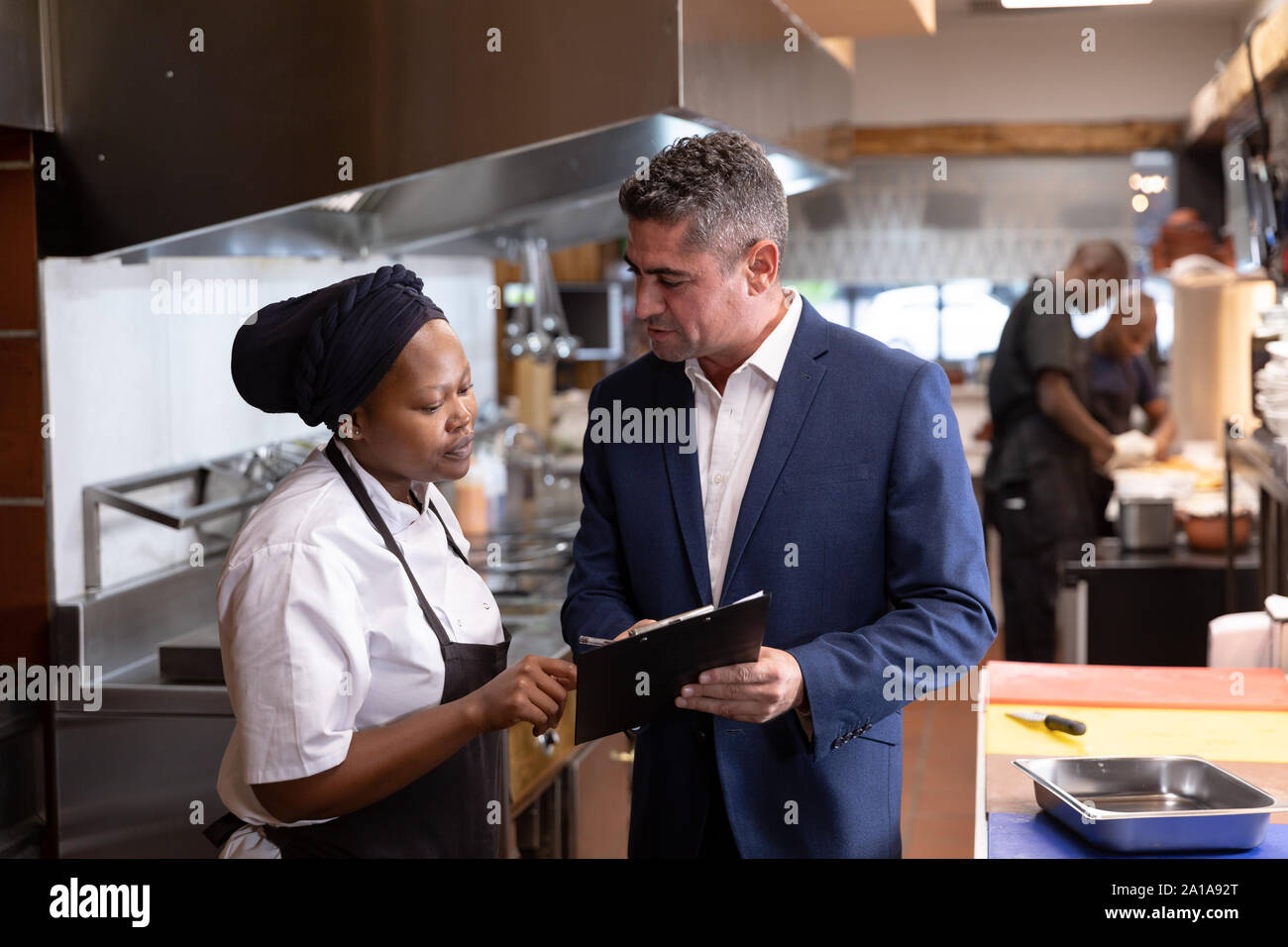 Restaurant staff and manager hi-res stock photography and images - Alamy