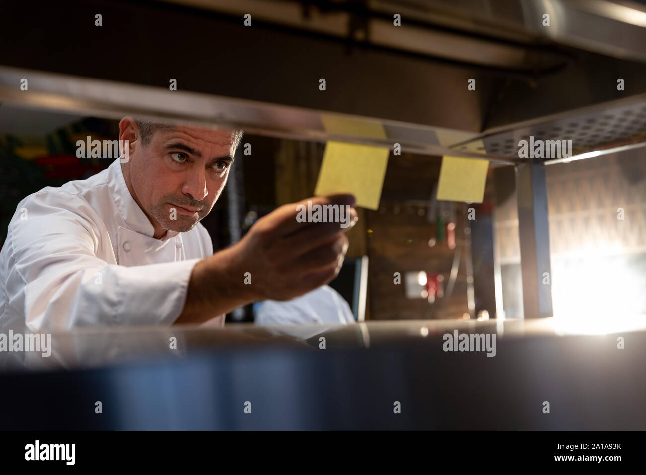 Checking the menu hi-res stock photography and images - Alamy