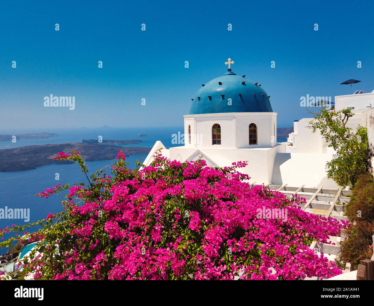 Majestic view of Nikolaus monastery with domed church and pink flowers ...