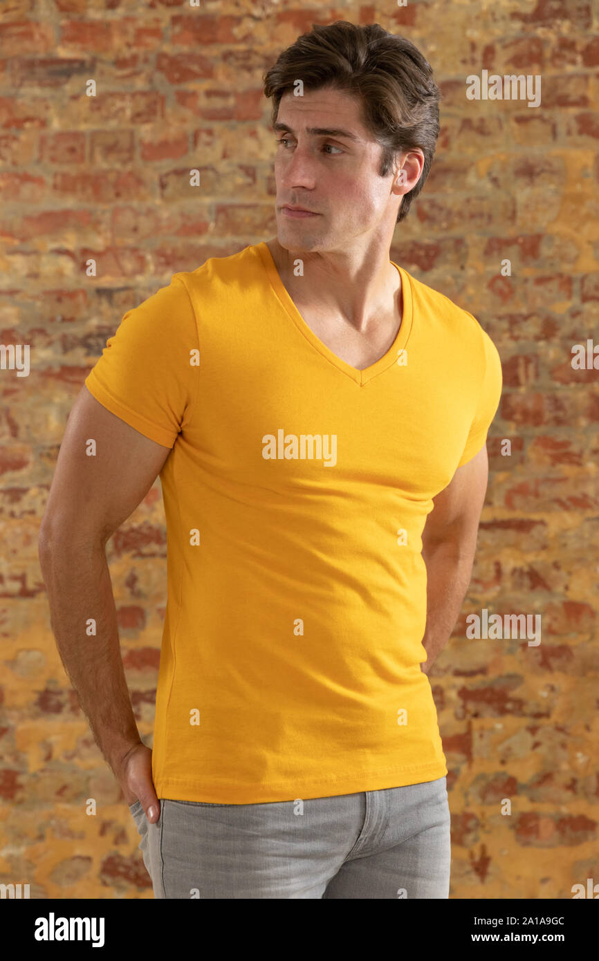 Young man wearing jeans and t shirt hi-res stock photography and images ...