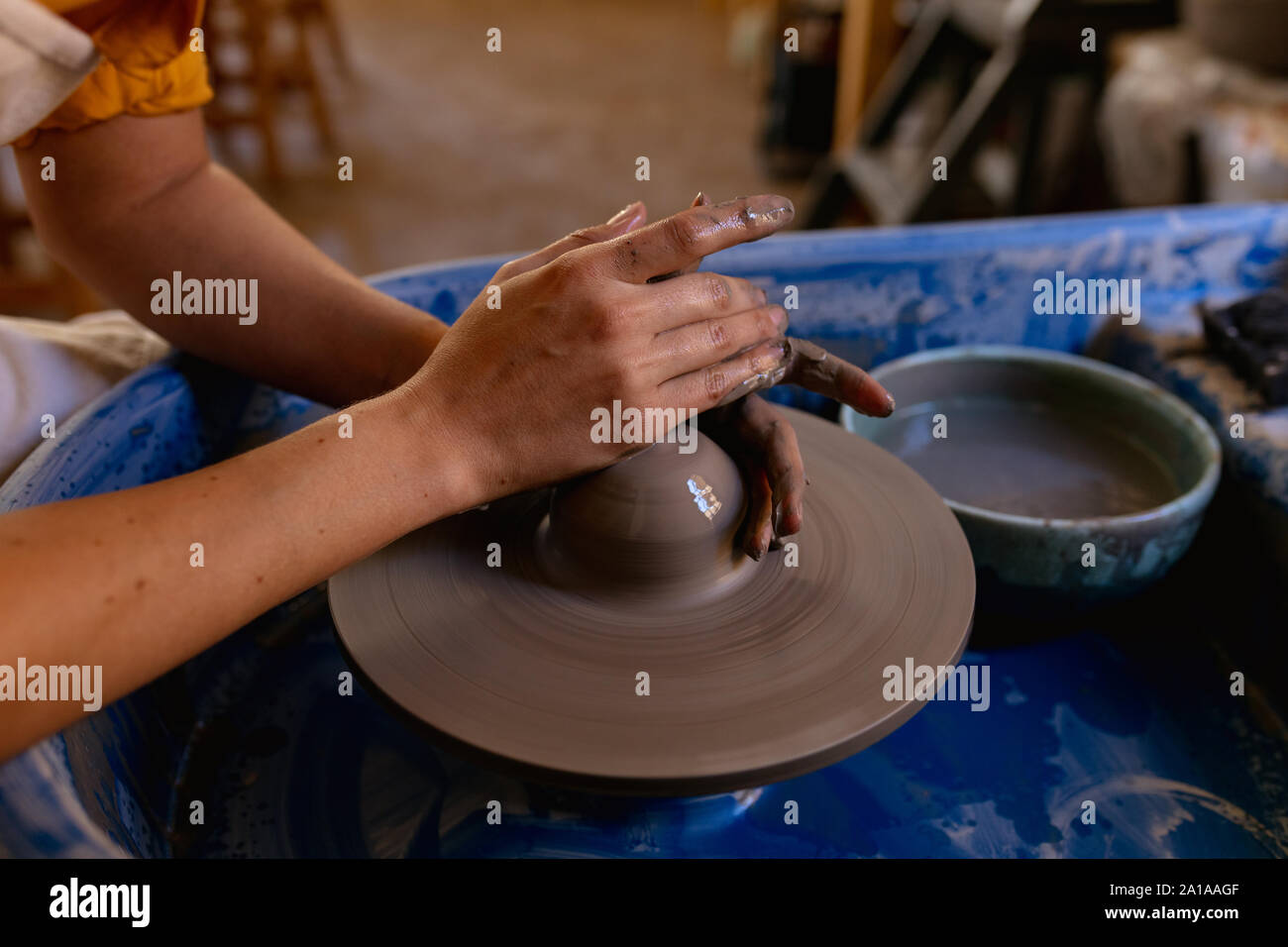 Pottery wheel hands hi-res stock photography and images - Alamy