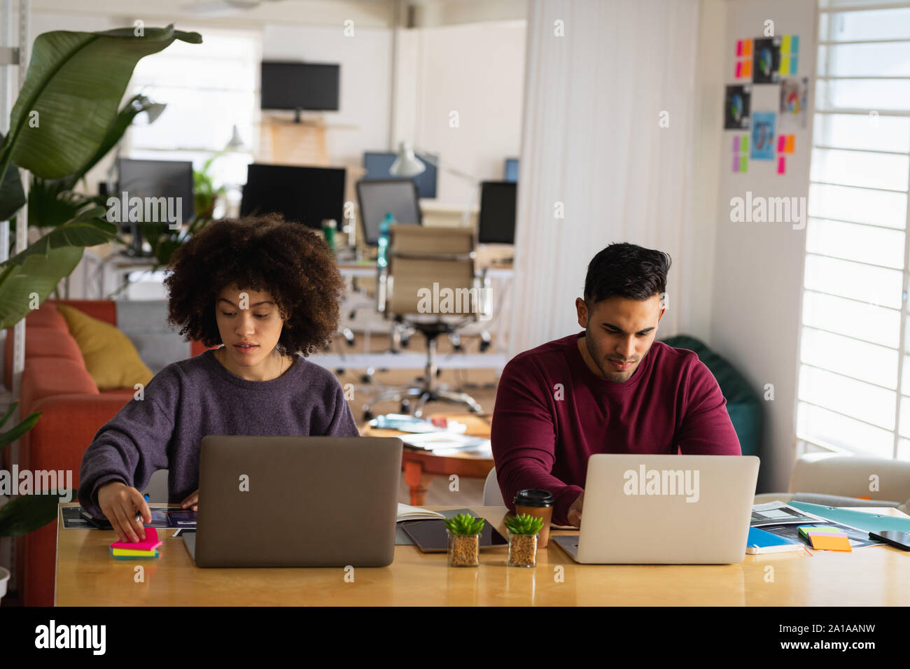 Young creatives team working together hi-res stock photography and ...
