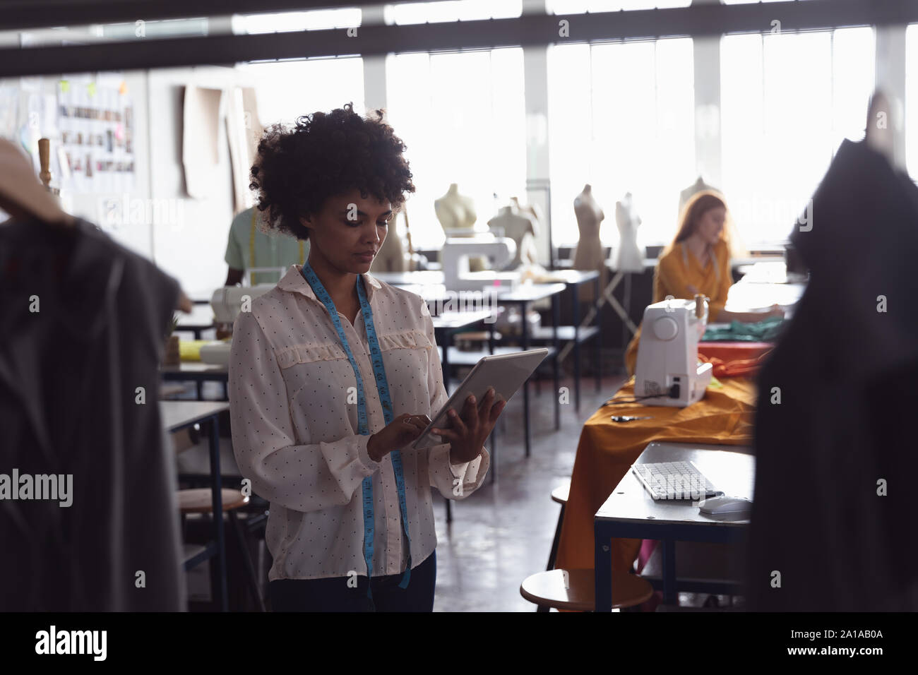 Young students working on projects at a fashion college Stock Photo - Alamy