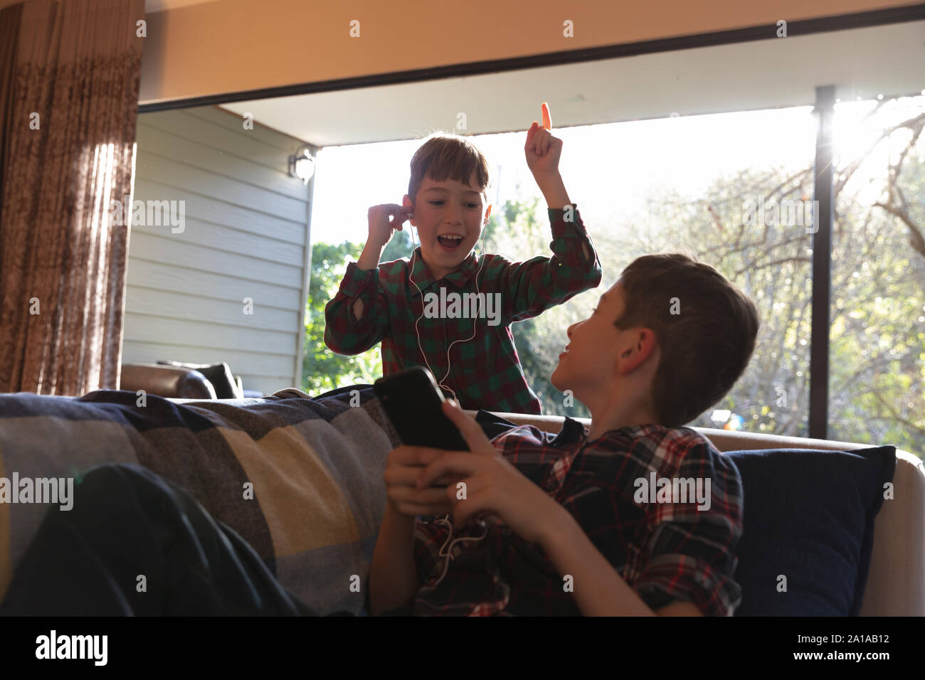 Happy family interacting using hi-res stock photography and images - Alamy