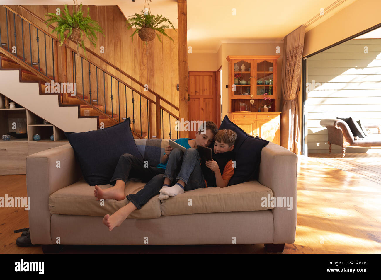 Brothers enjoying time together at home Stock Photo - Alamy