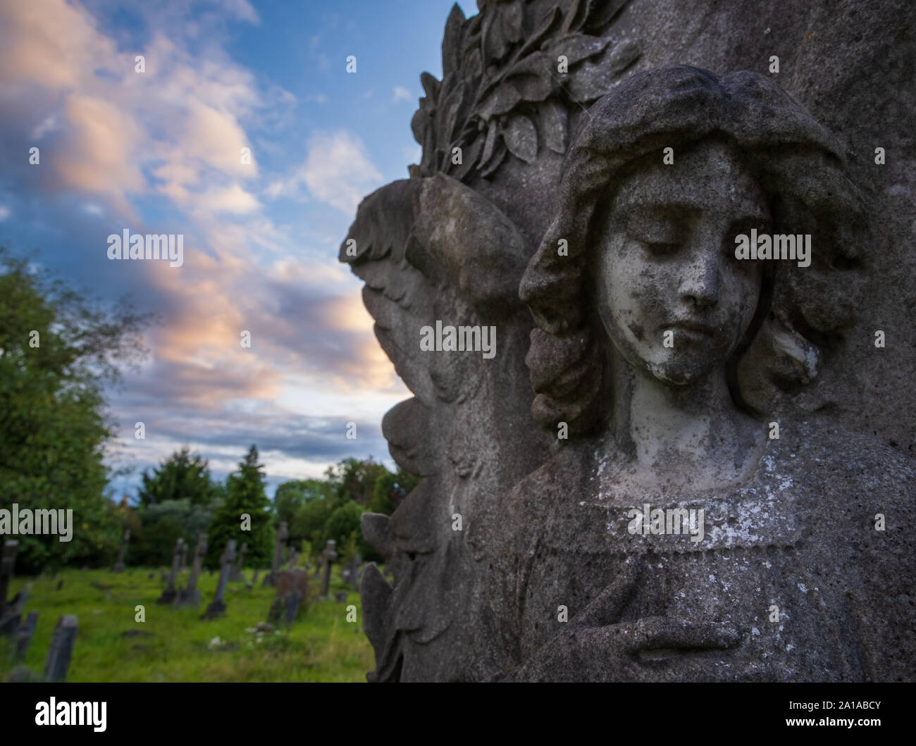 Stone angel in old cemetery, Thames Ditton, London Stock Photo - Alamy