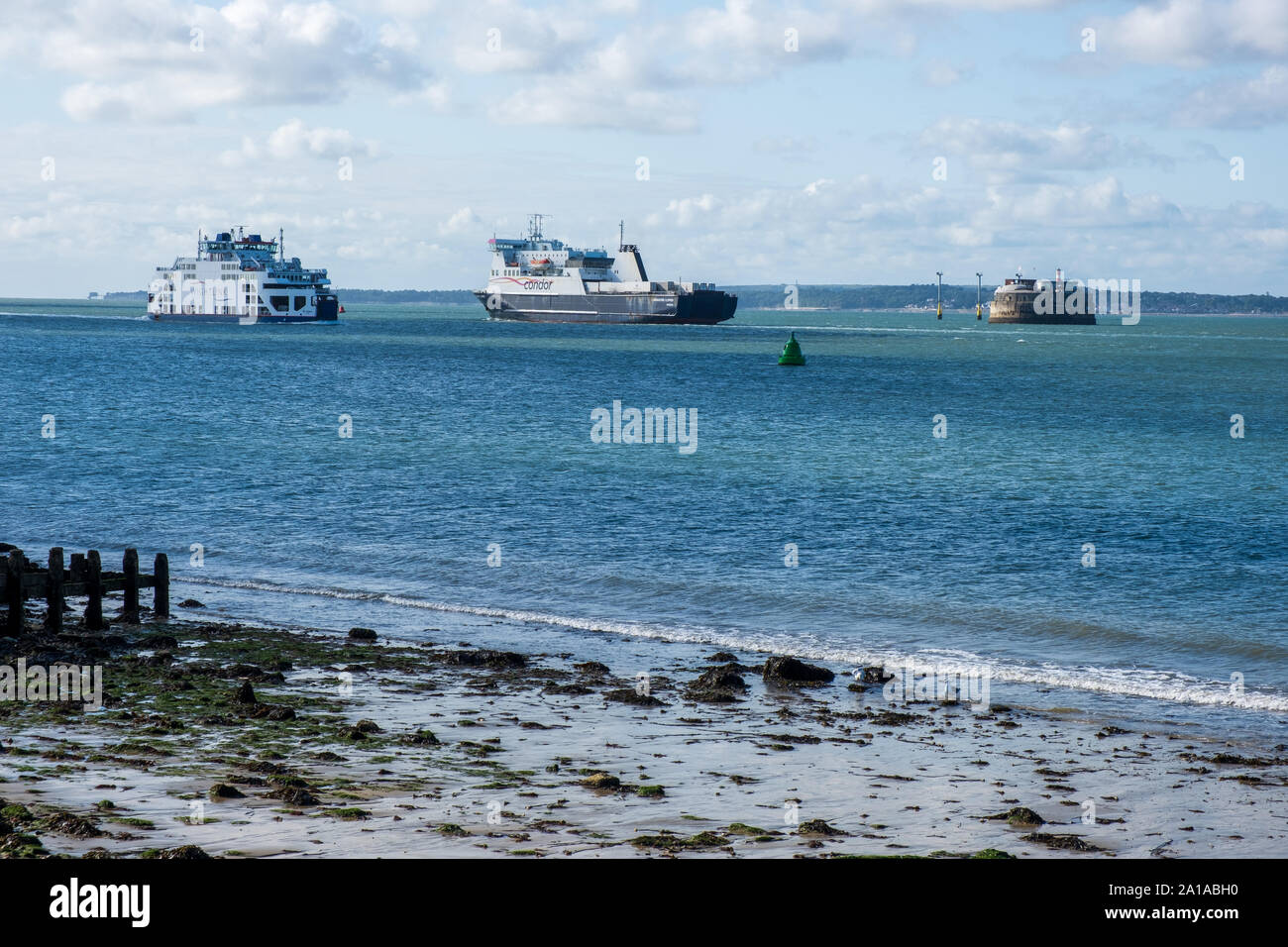 Ferries pass Spitbank fort in Solent off Southsea, Portsmouth Stock ...