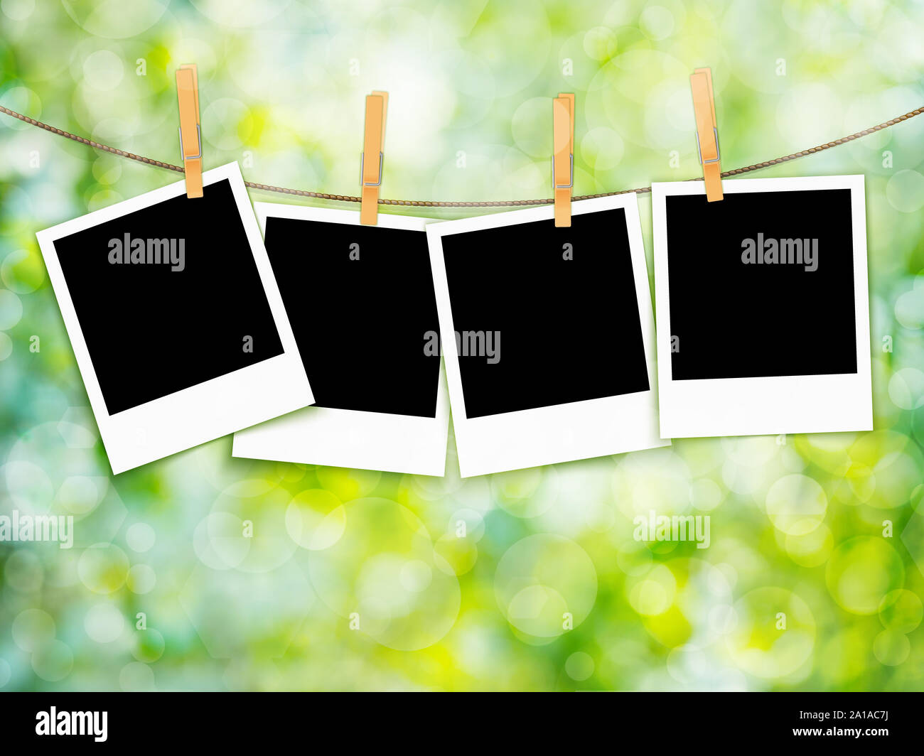 Spring or summer background with photos on rope Stock Photo - Alamy