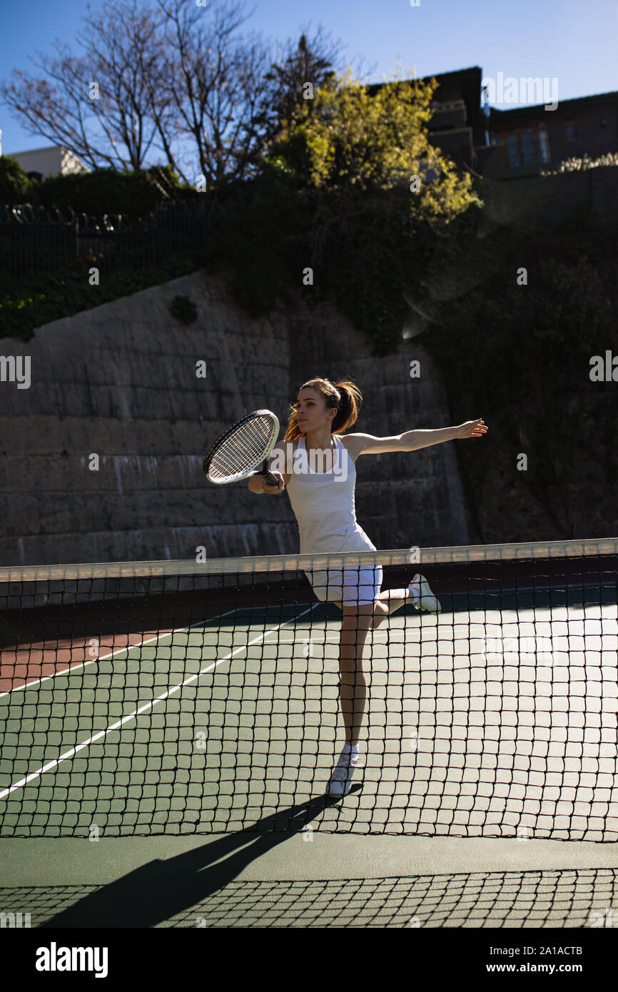 Woman playing tennis hi-res stock photography and images - Alamy