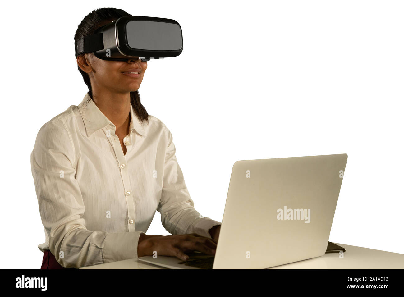 Using laptop and vr goggles hi-res stock photography and images - Alamy