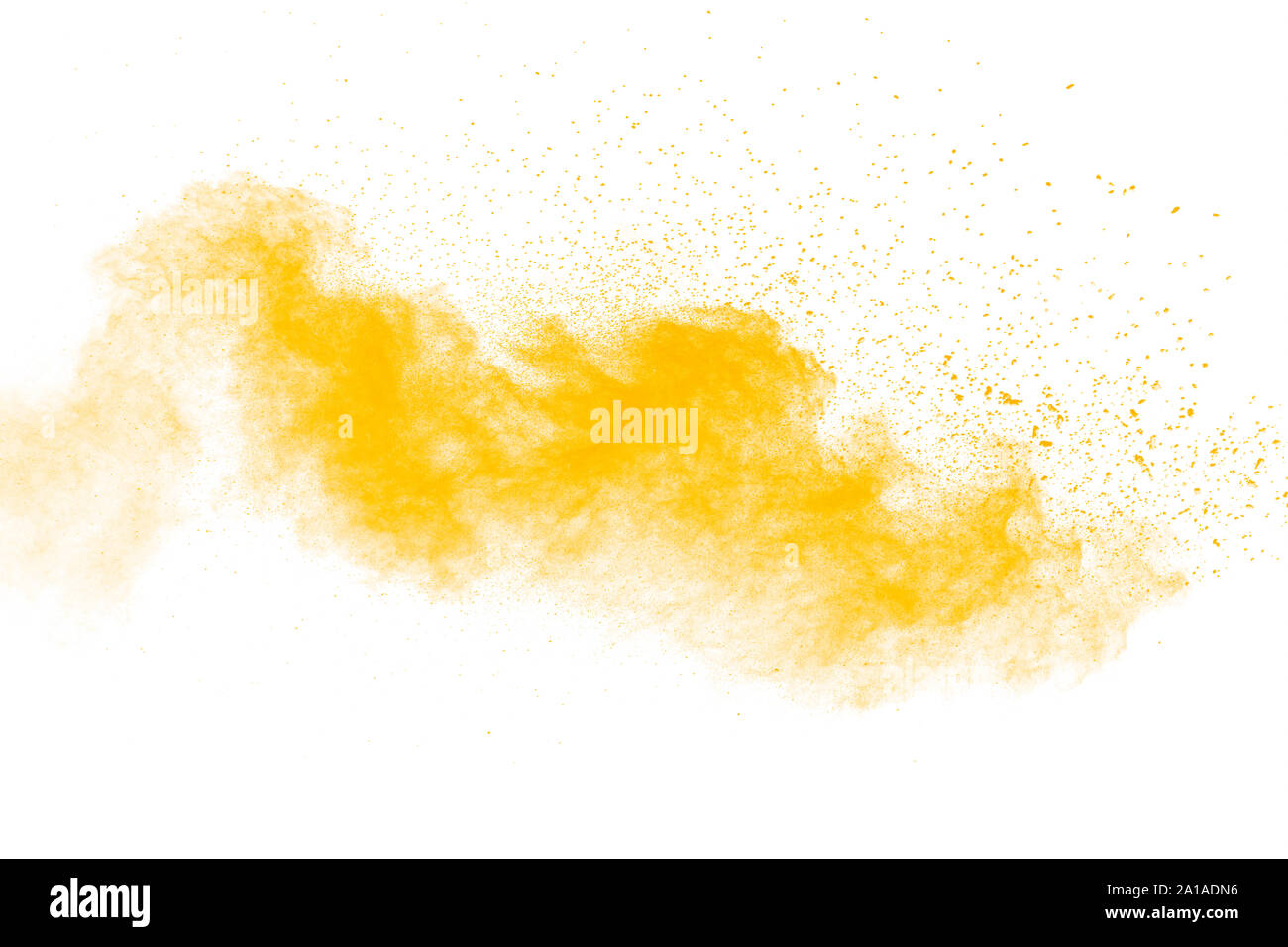Abstract yellow powder explosion on white background.Freeze motion of ...