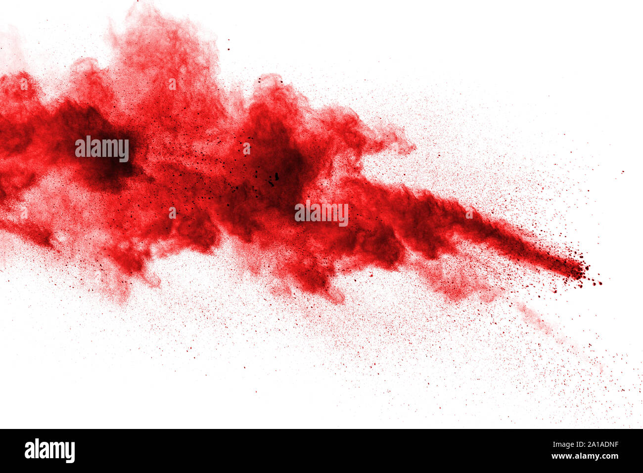 Red powder explosion cloud on white background. Freeze motion of red ...