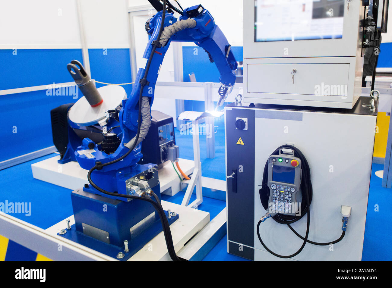Automatic welding robot in a modern factory in operation Stock Photo ...