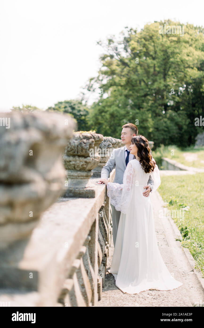 Stylish bride and groom. wedding couple. Happy bride and groom on their ...