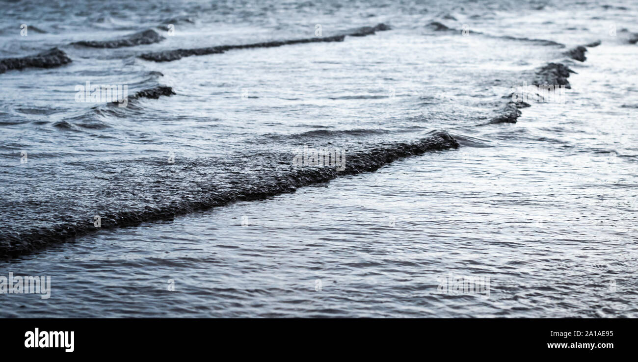 small waves on the sea surface Stock Photo - Alamy