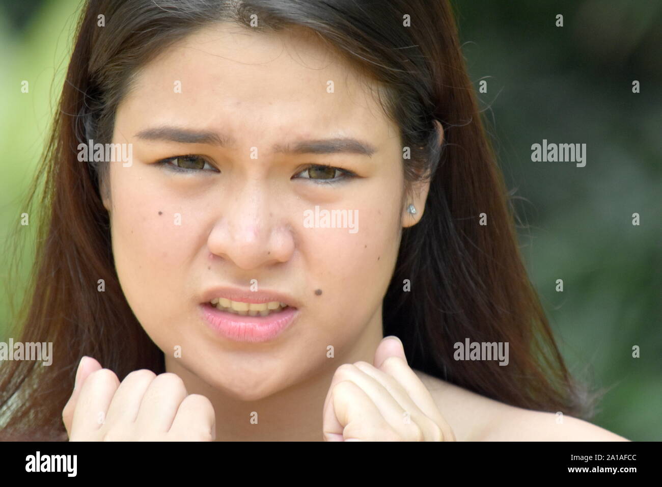 A Fearful Adult Female Stock Photo - Alamy