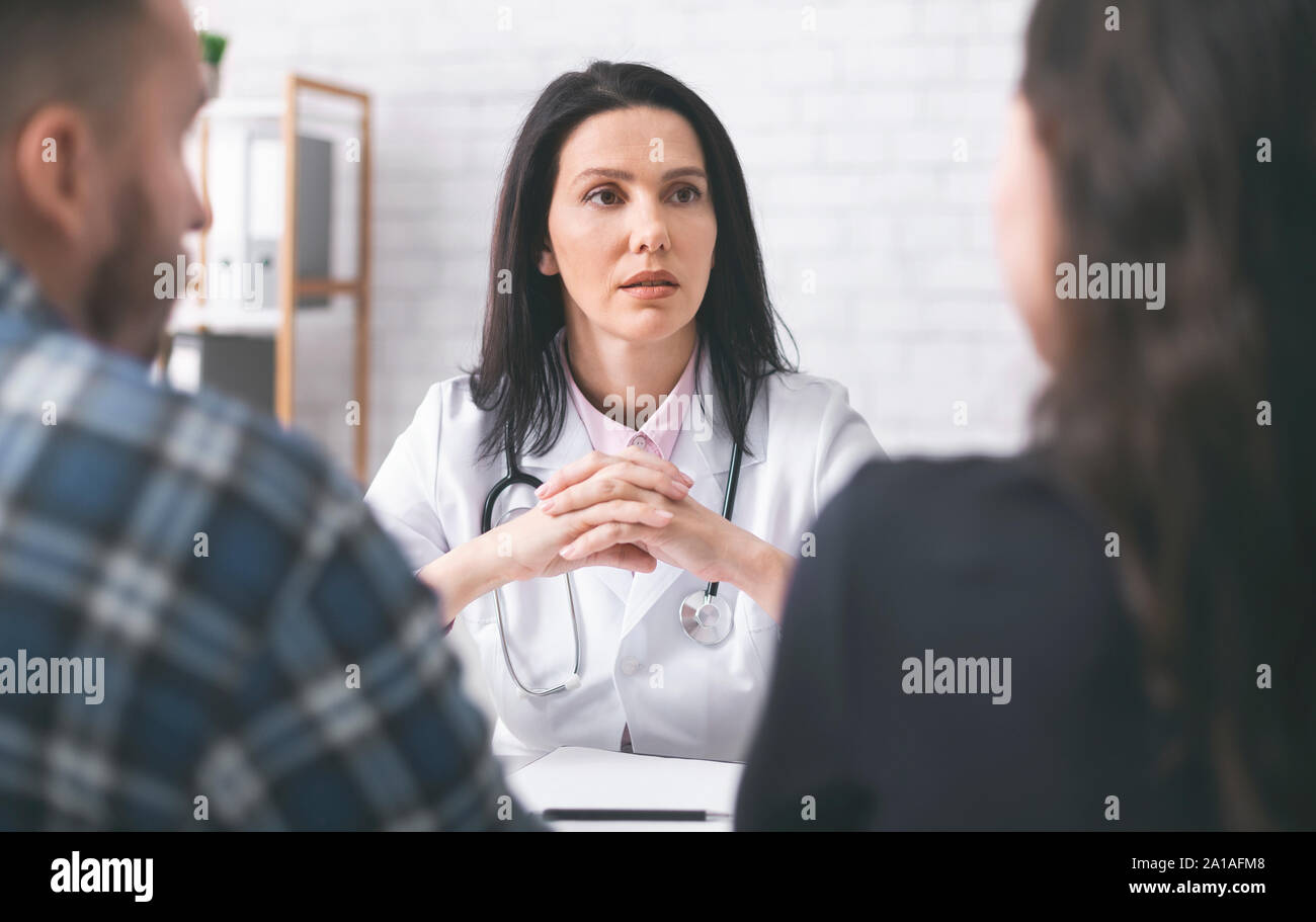 Patient describing symptoms to doctor hi-res stock photography and ...