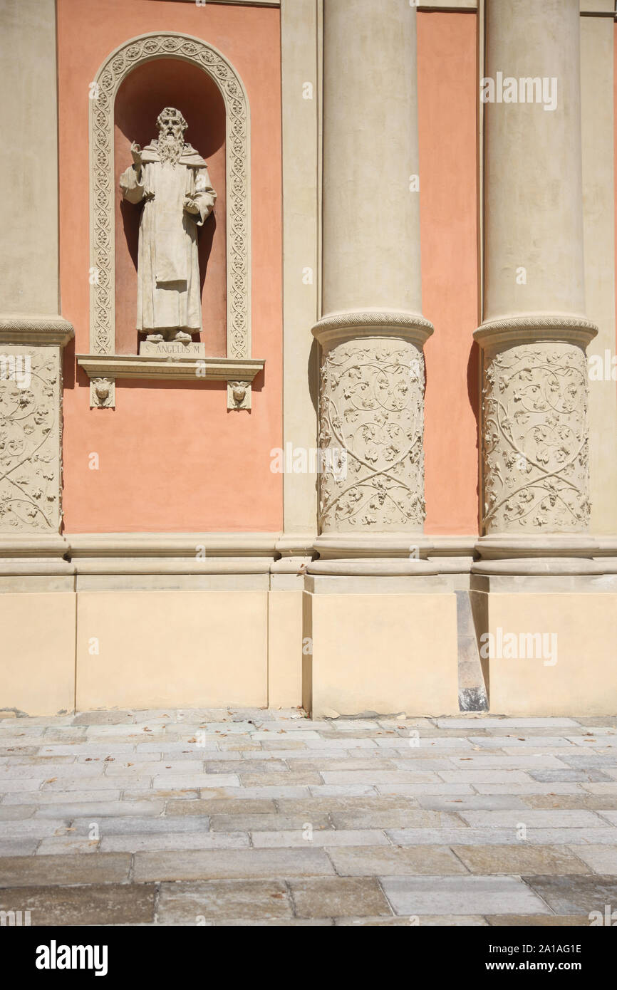 Statue of St. Angel in a niche on the facade of the cathedral. Italy ...