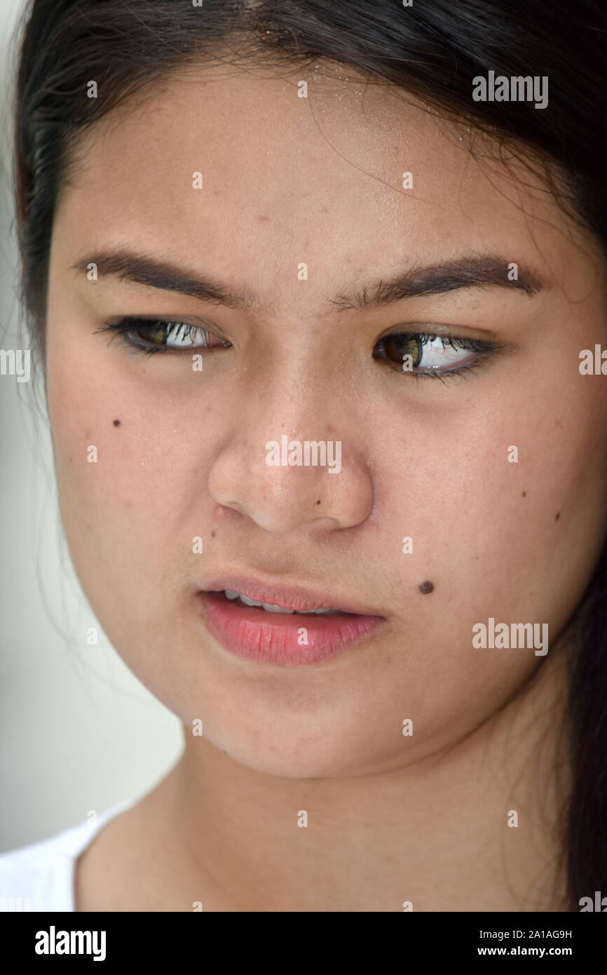 Cute attractive young female watching hi-res stock photography and ...