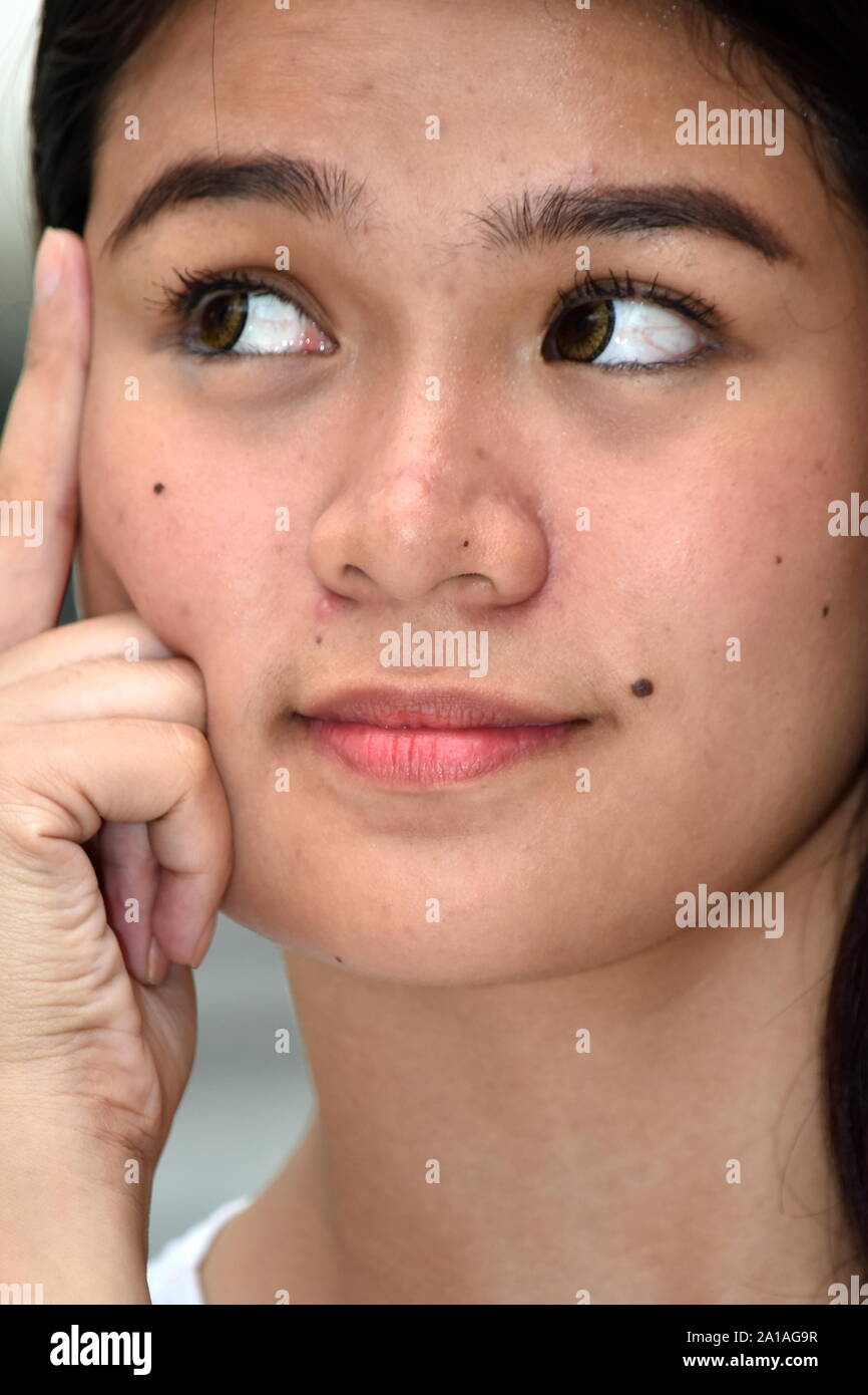 An Adult Female Making A Decision Stock Photo - Alamy