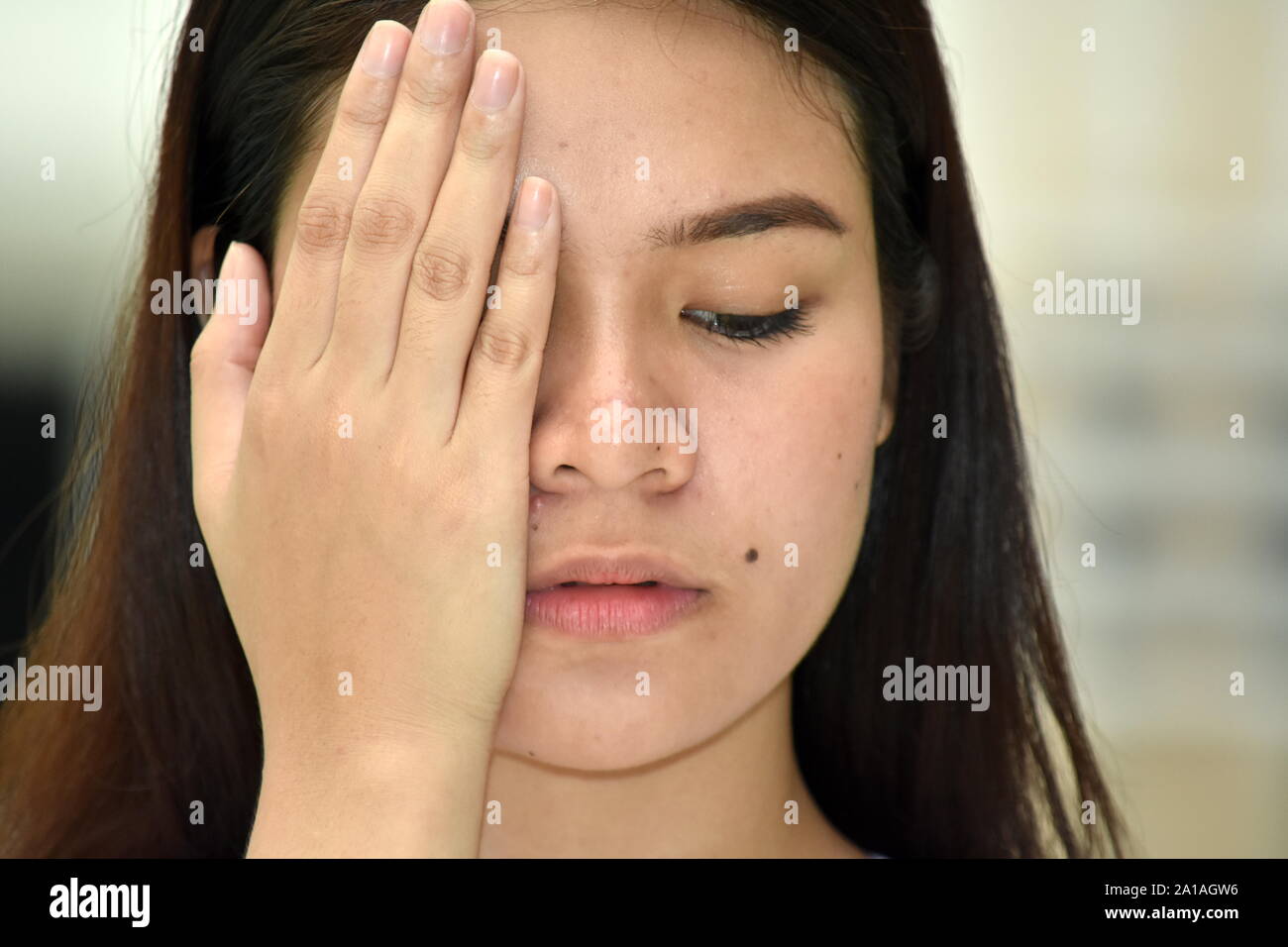 A Beautiful Asian Woman And Disappointment Stock Photo - Alamy