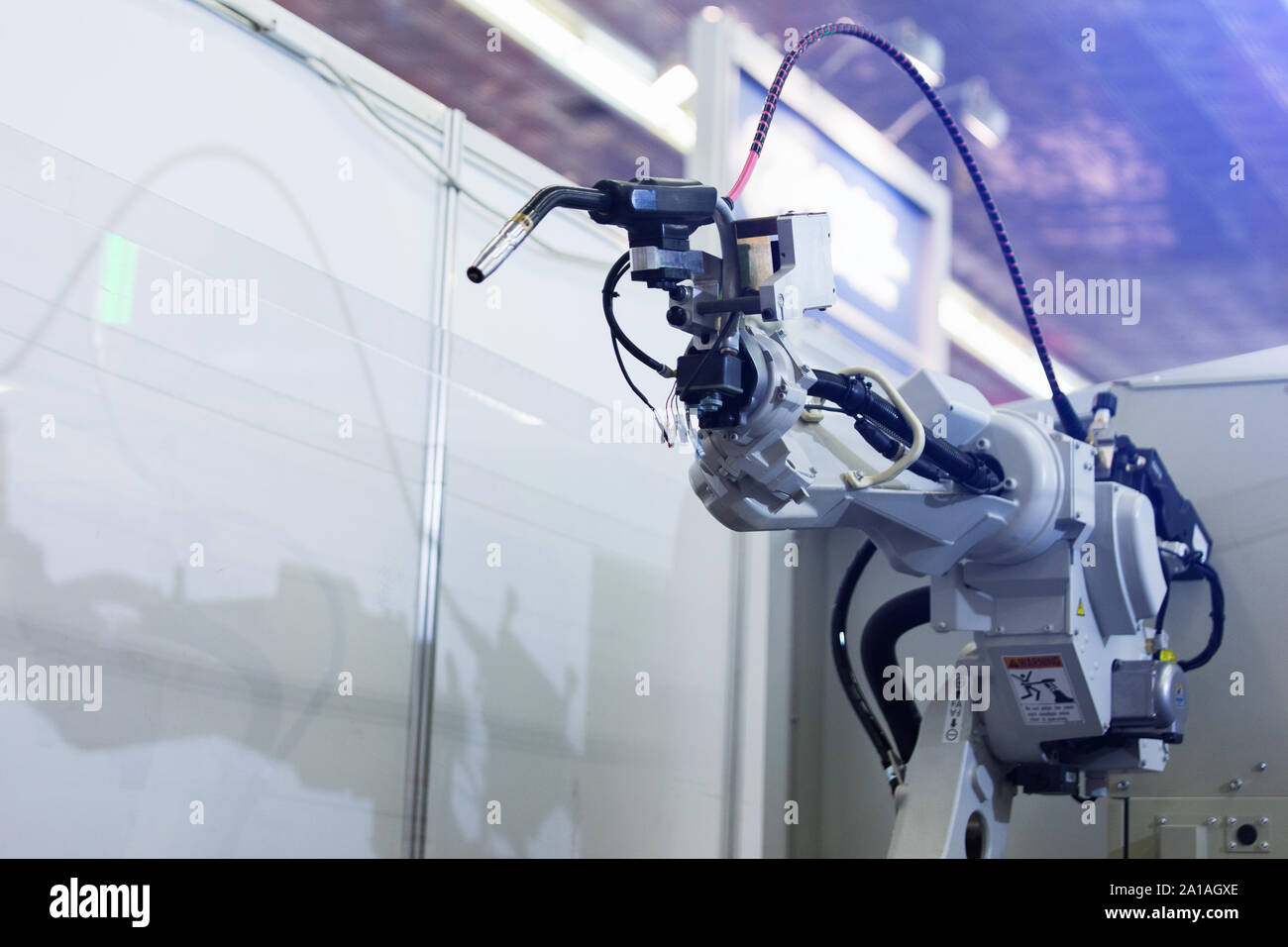 Automatic welding robot in a modern factory in operation Stock Photo ...