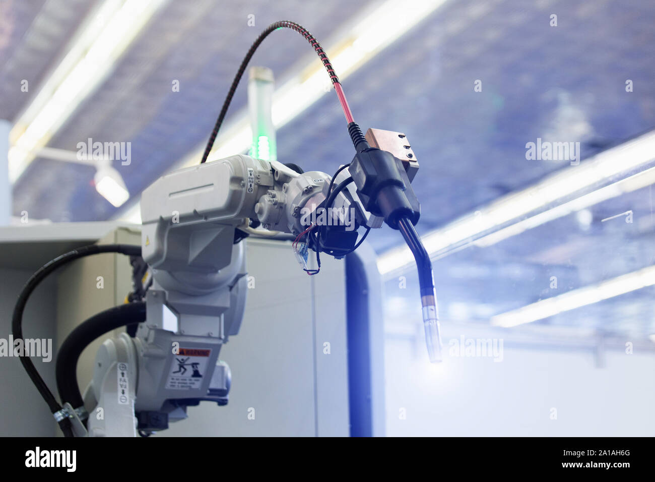 Automatic welding robot in a modern factory in operation Stock Photo ...