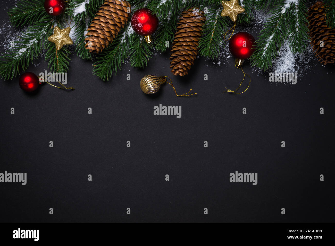 Christmas background with decorations on black Stock Photo - Alamy