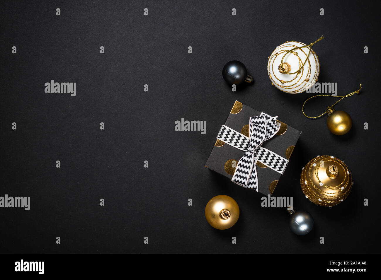 Christmas background with decorations on black Stock Photo - Alamy