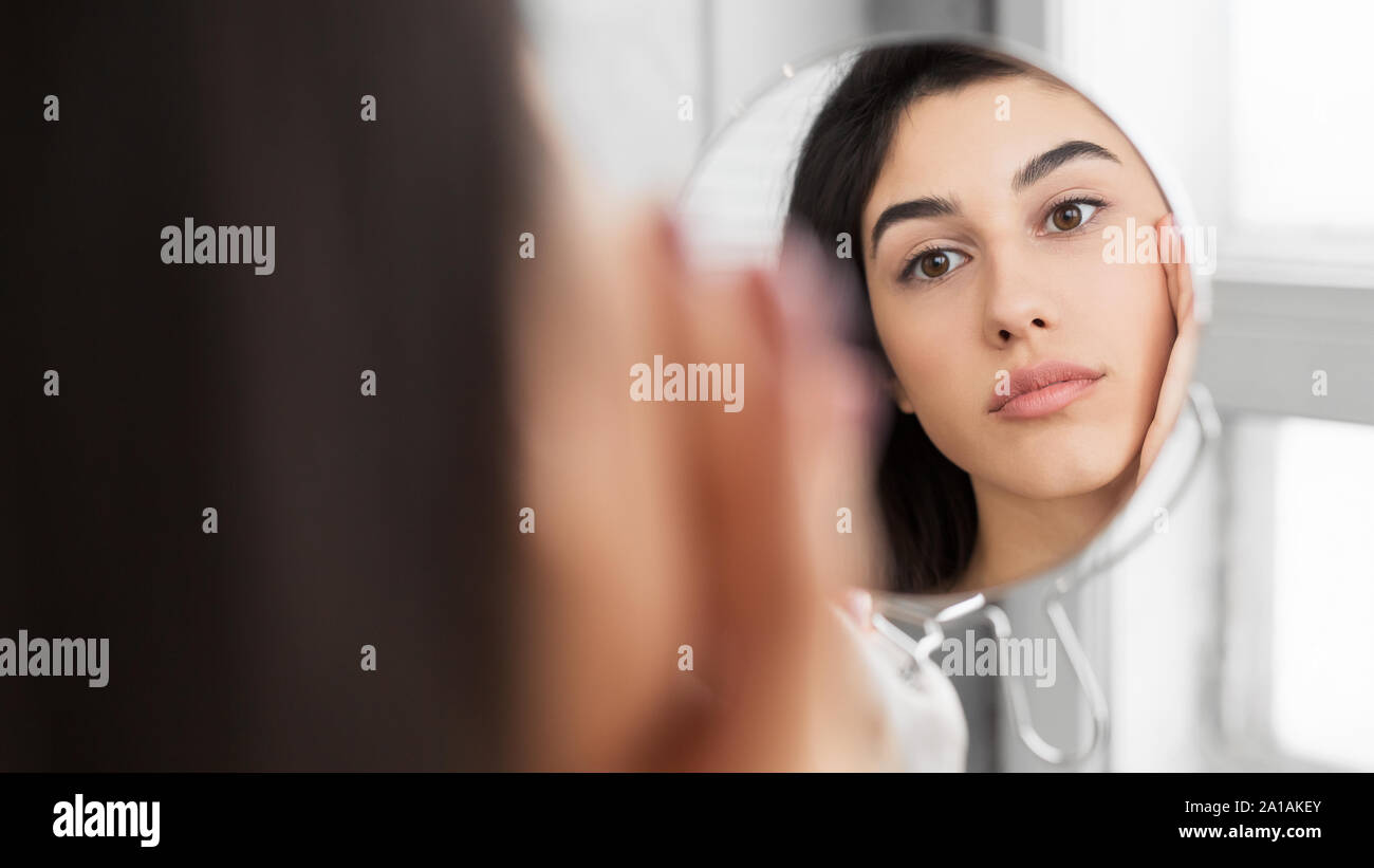 Girl Touching Face Looking At Perfect Skin In Mirror Panorama Stock