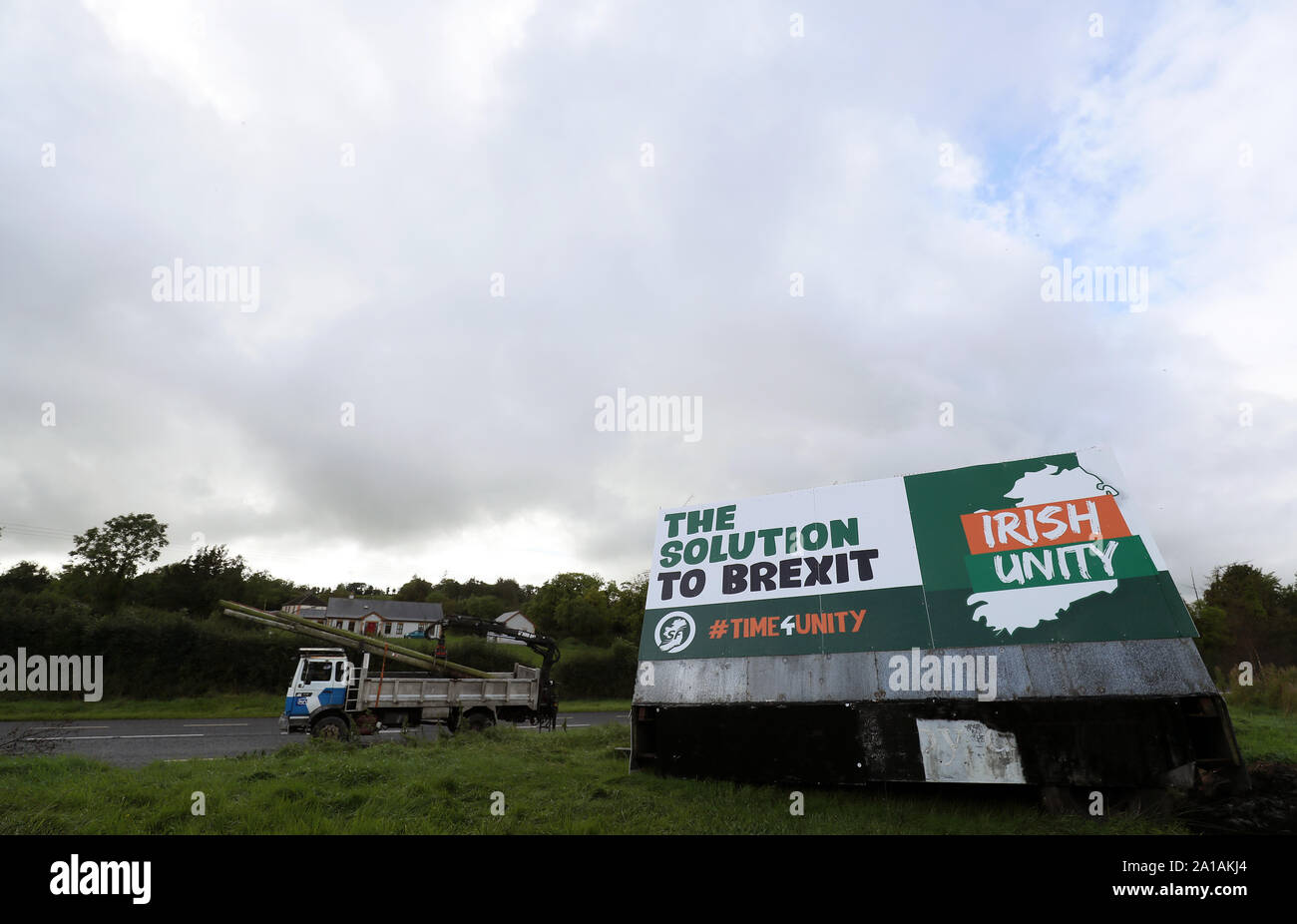 A Sinn Fein poster proposing Irish unity as a solution to Brexit on the ...