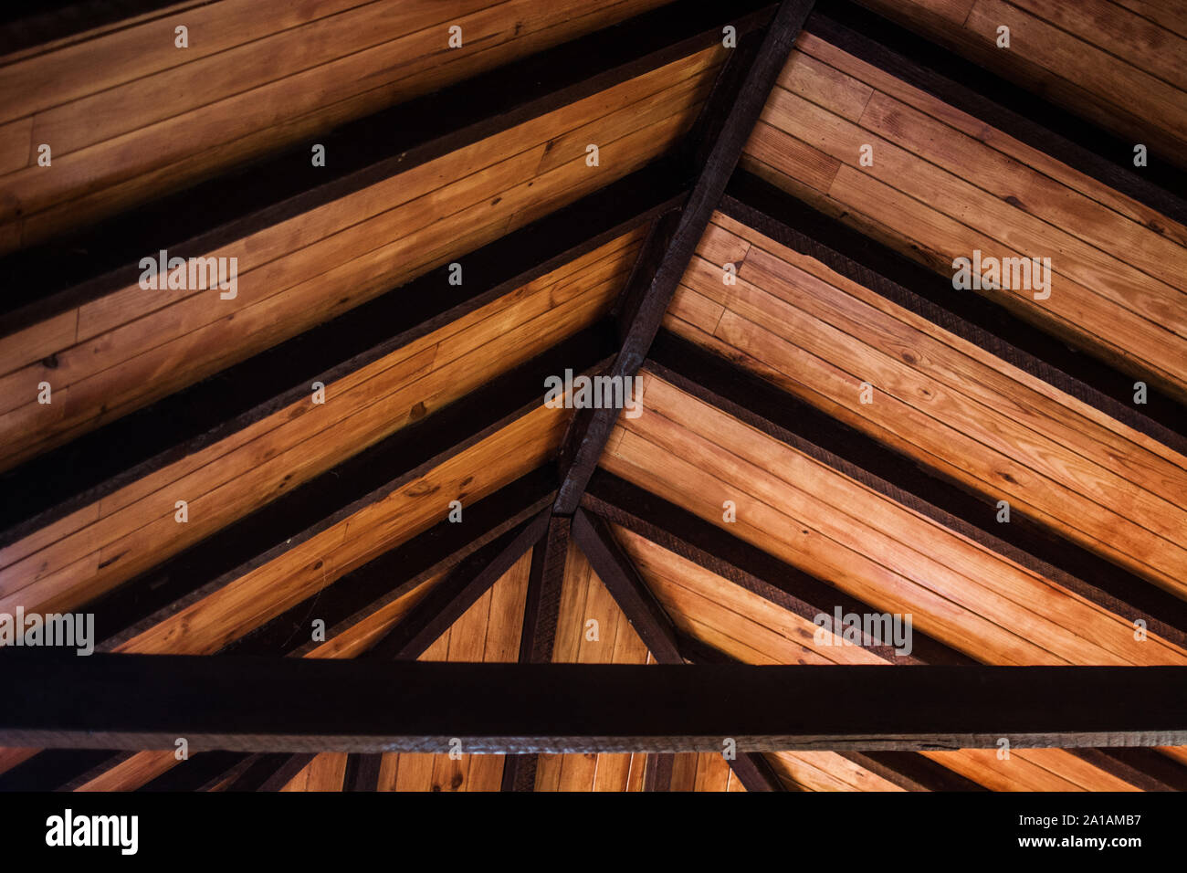 Roof of a stable background. Wooden material Stock Photo - Alamy