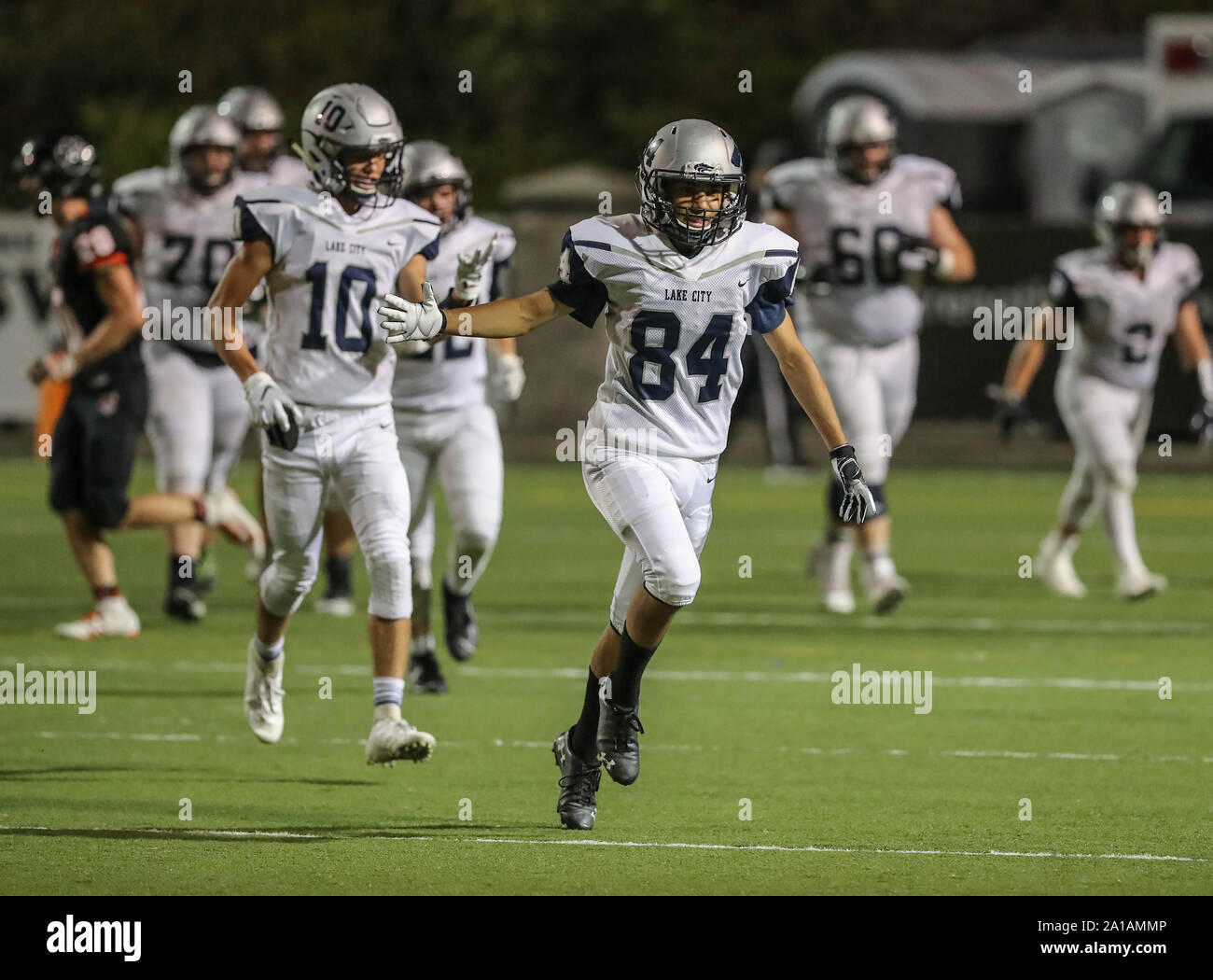 Football action with Lake City vs Lewis and Clark High School at Joe ...