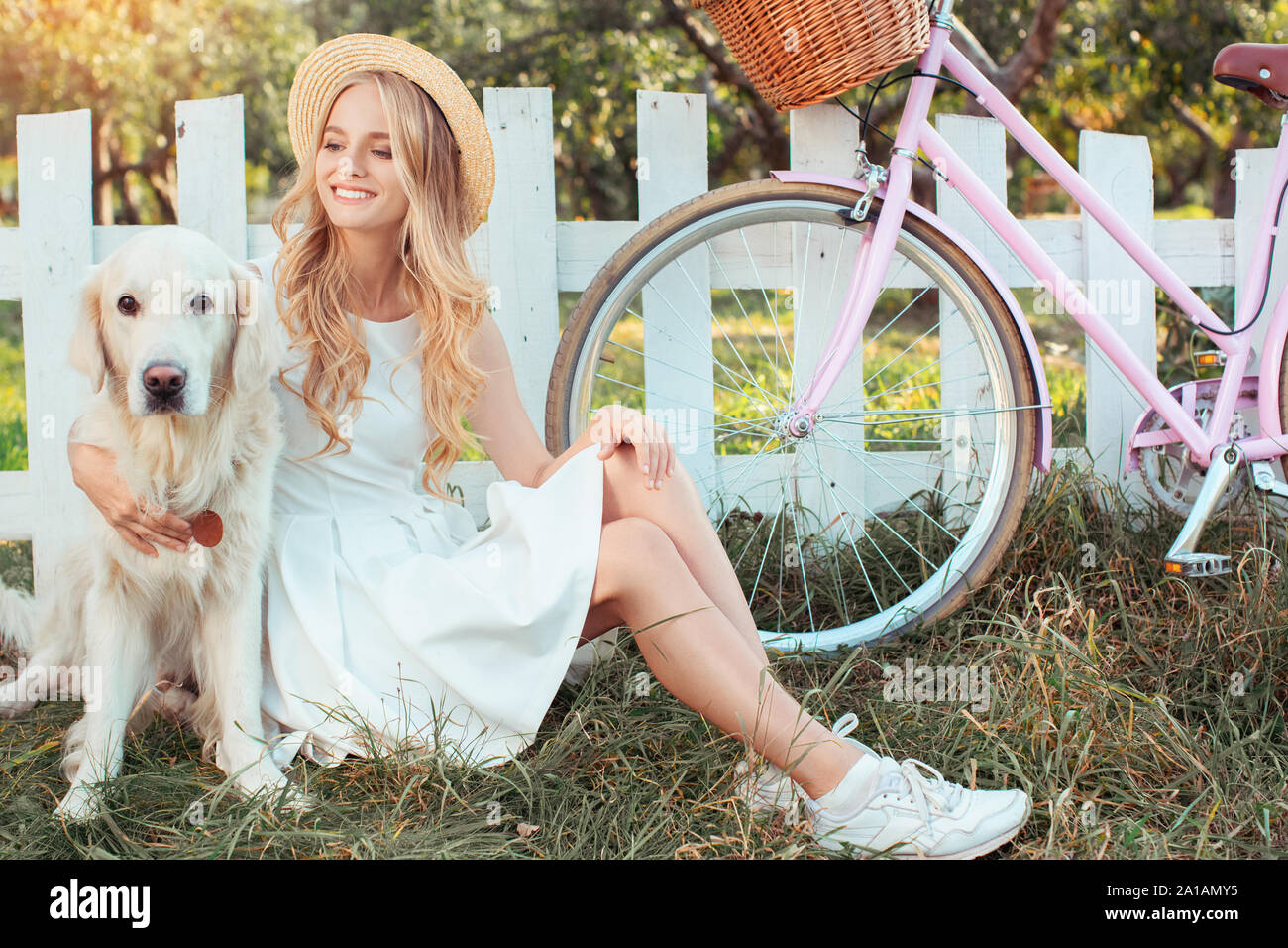 Young woman blonde hair summer style concept Stock Photo - Alamy