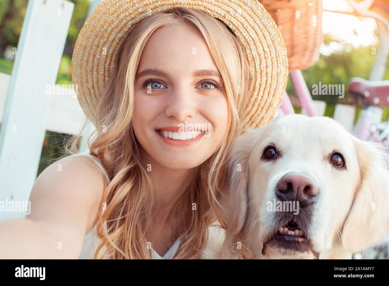 Young woman blonde hair summer style concept Stock Photo - Alamy
