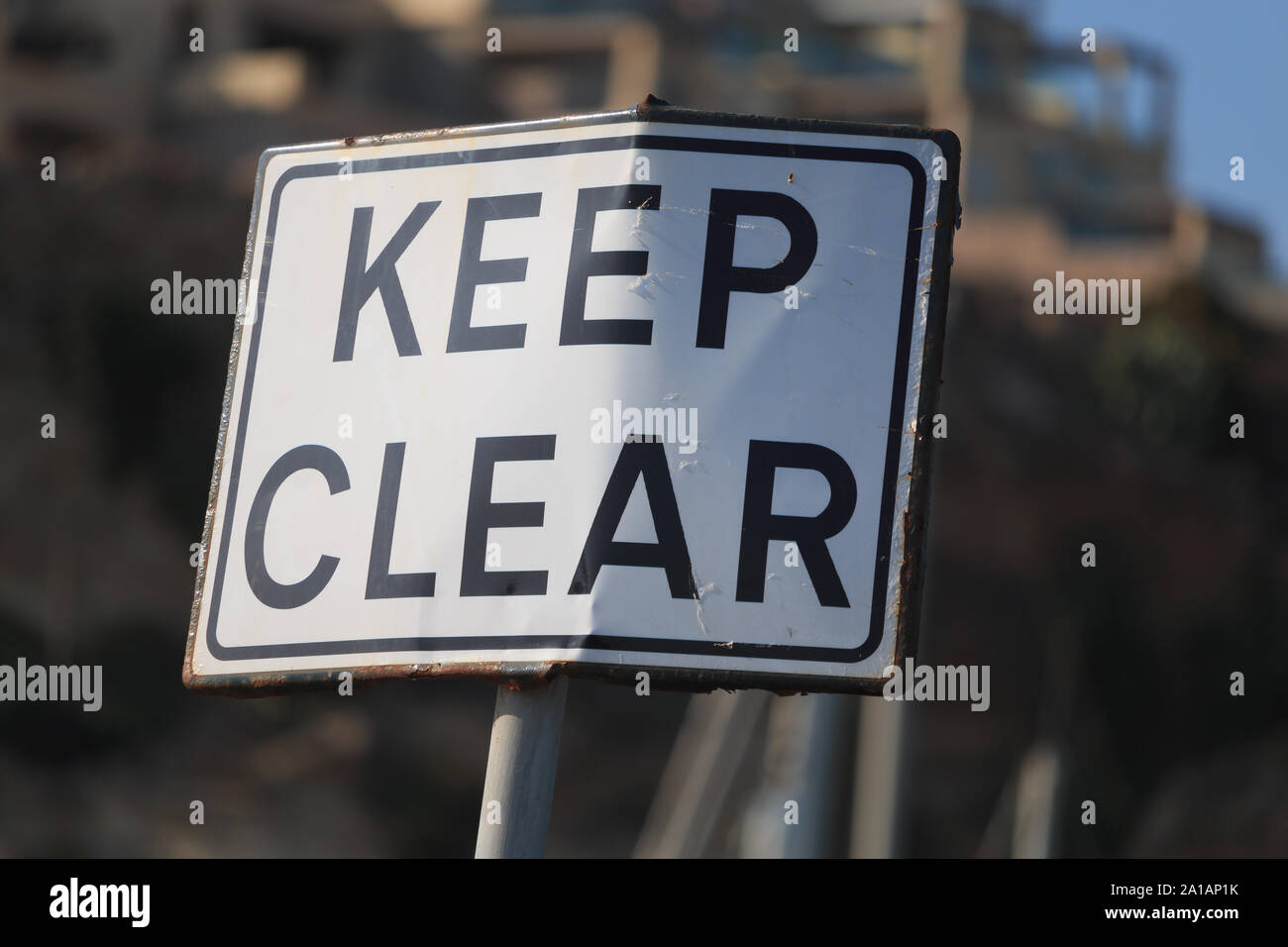 Keep clear road sign on blur background, horizontal Stock Photo - Alamy