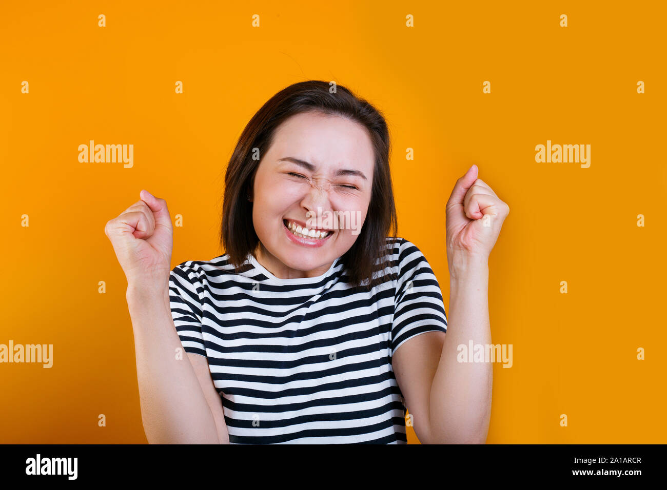 Winning success happy woman celebrating being a winner. Human facial ...
