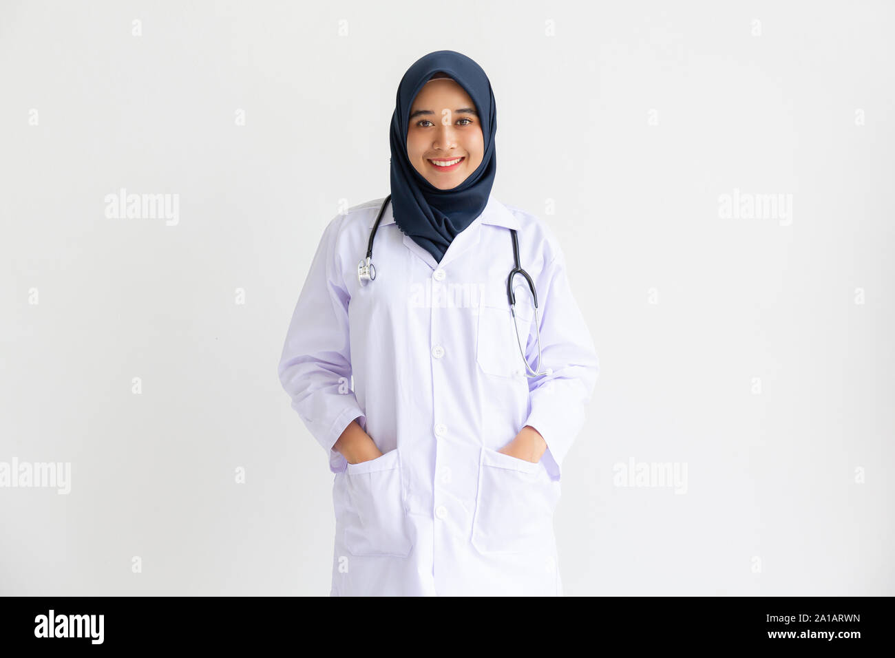 Young Arab Muslim intern doctor women smile on isolate white background ...